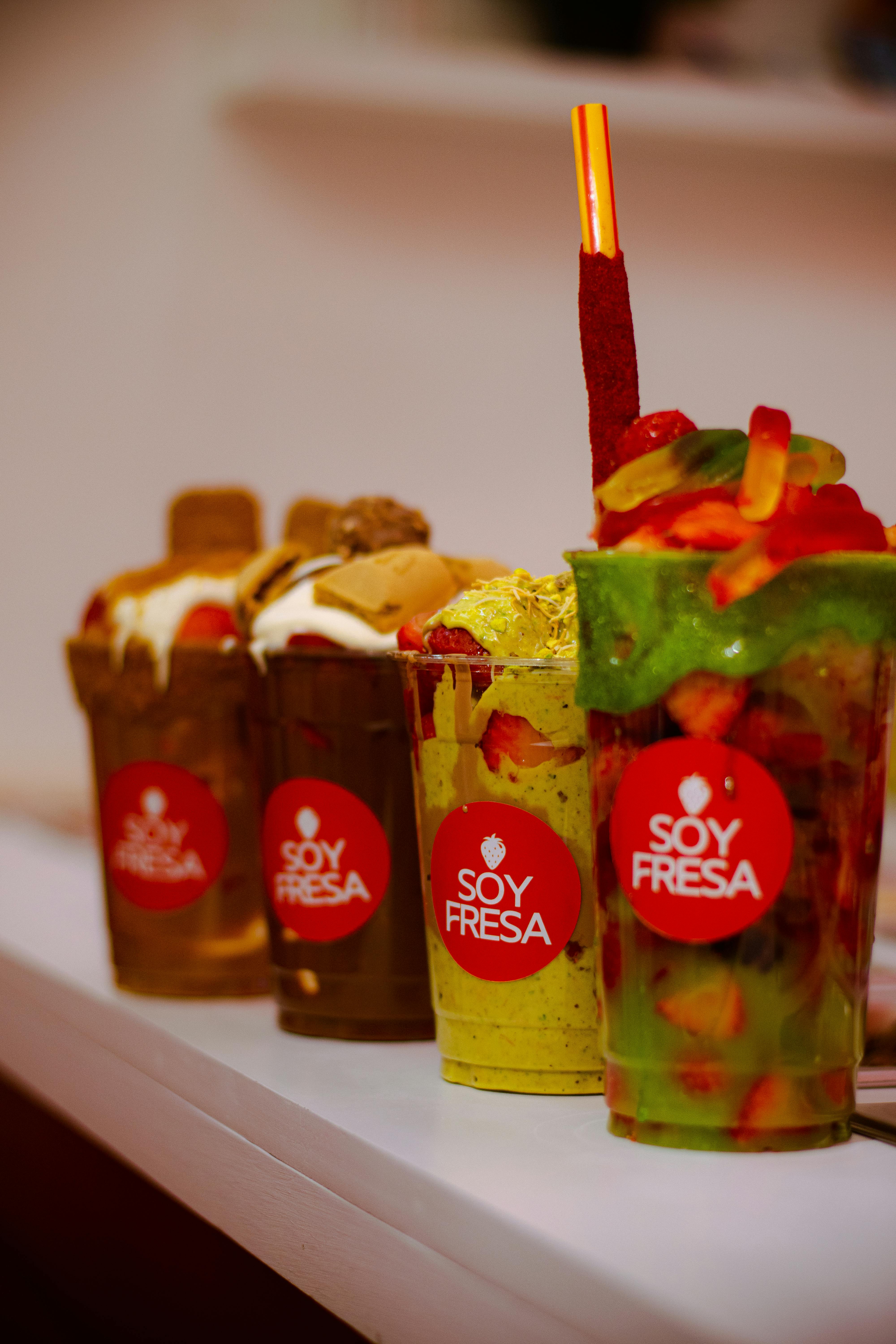 Colorful Mexican Fruit Desserts with Toppings · Free Stock Photo