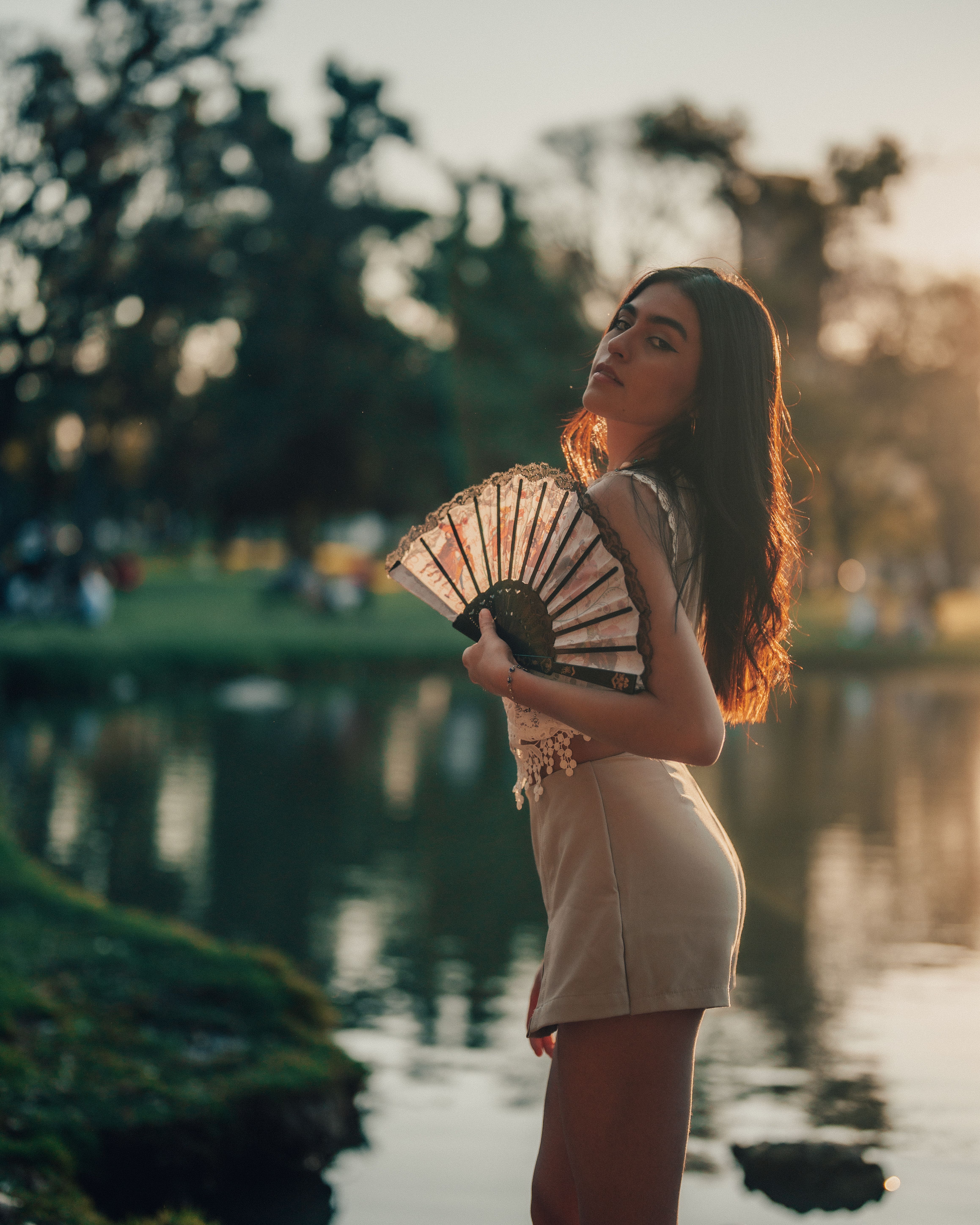 Portrait of Woman with Fan in Buenos Aires Park · Free Stock Photo