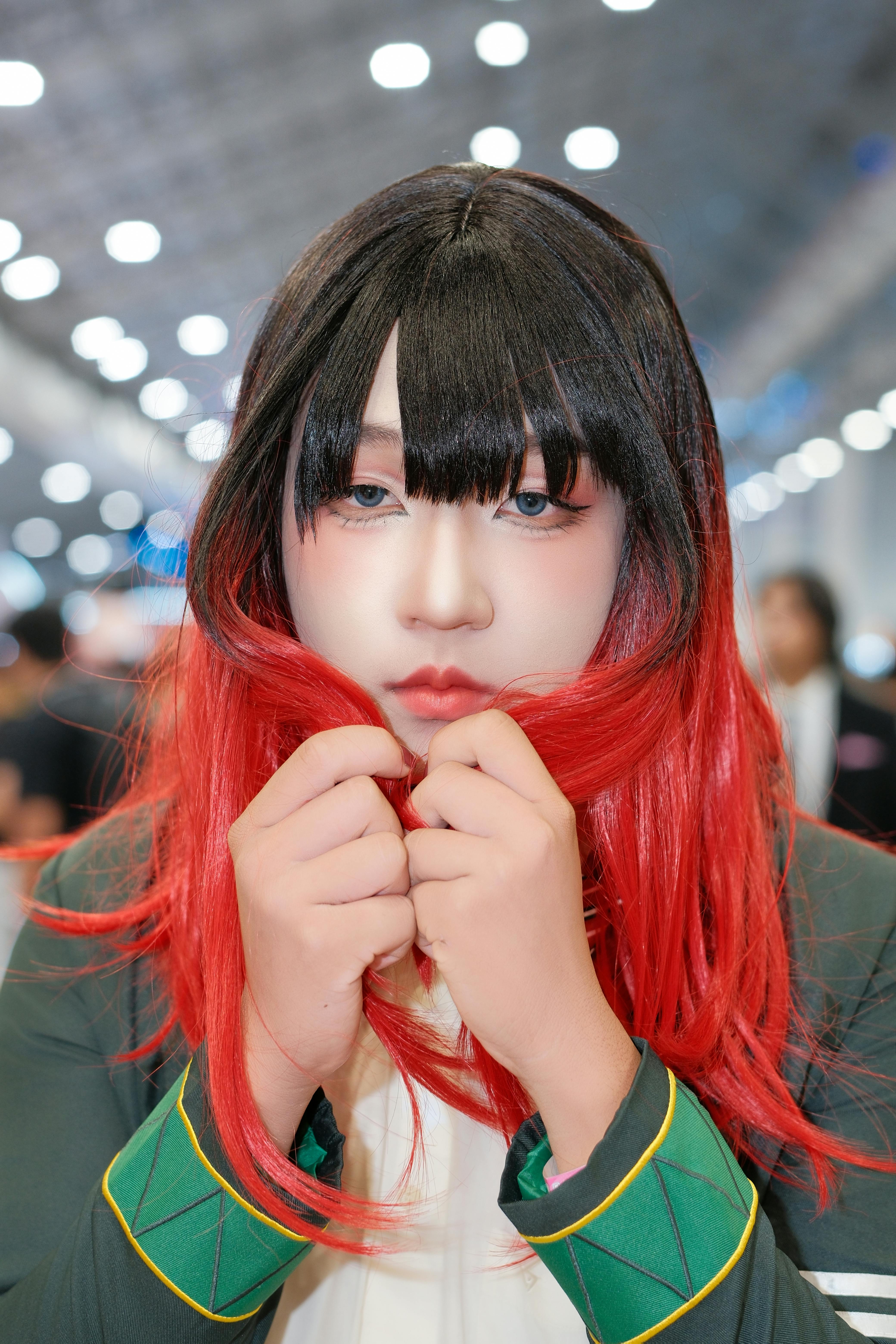 Colorful Cosplay Portrait at Convention · Free Stock Photo