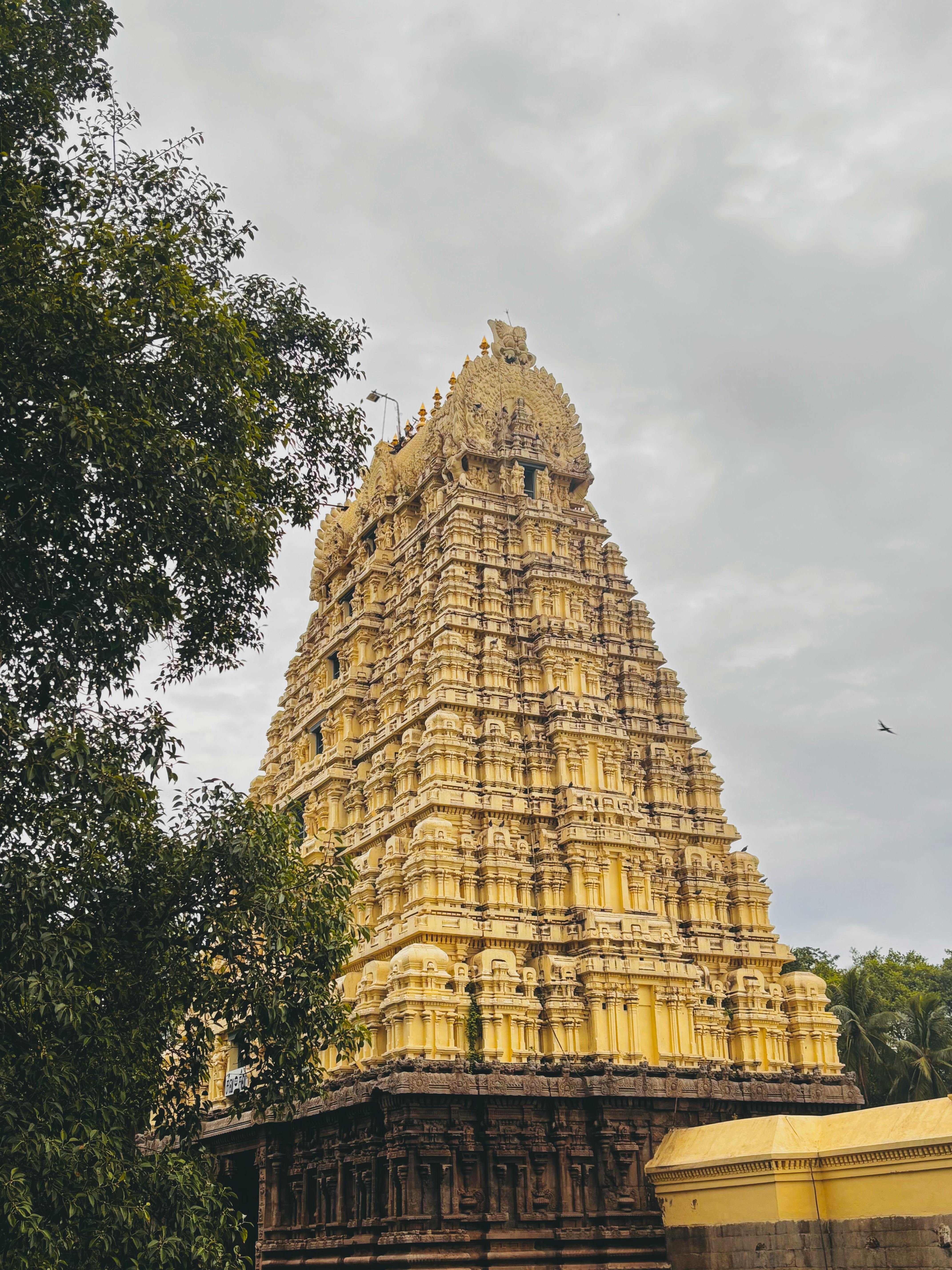 Colorful Hindu Temple Tower Against Blue Sky · Free Stock Photo