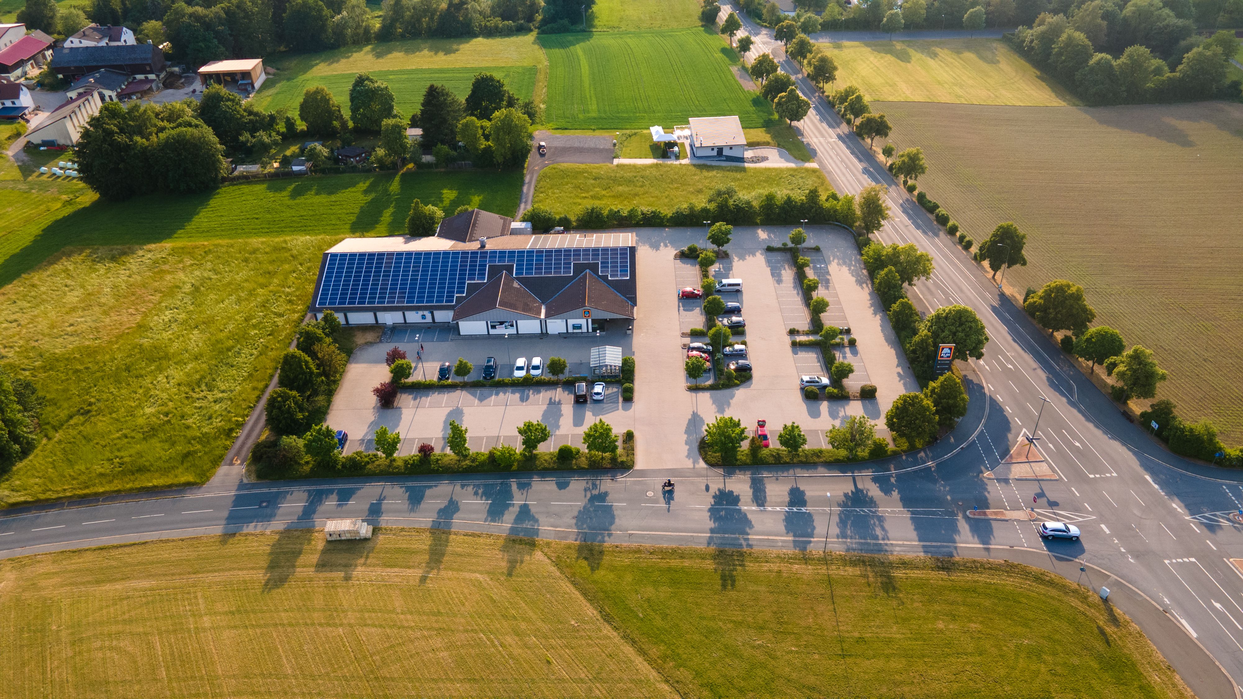 Aerial View of Solar-Powered Building in Rehau · Free Stock Photo
