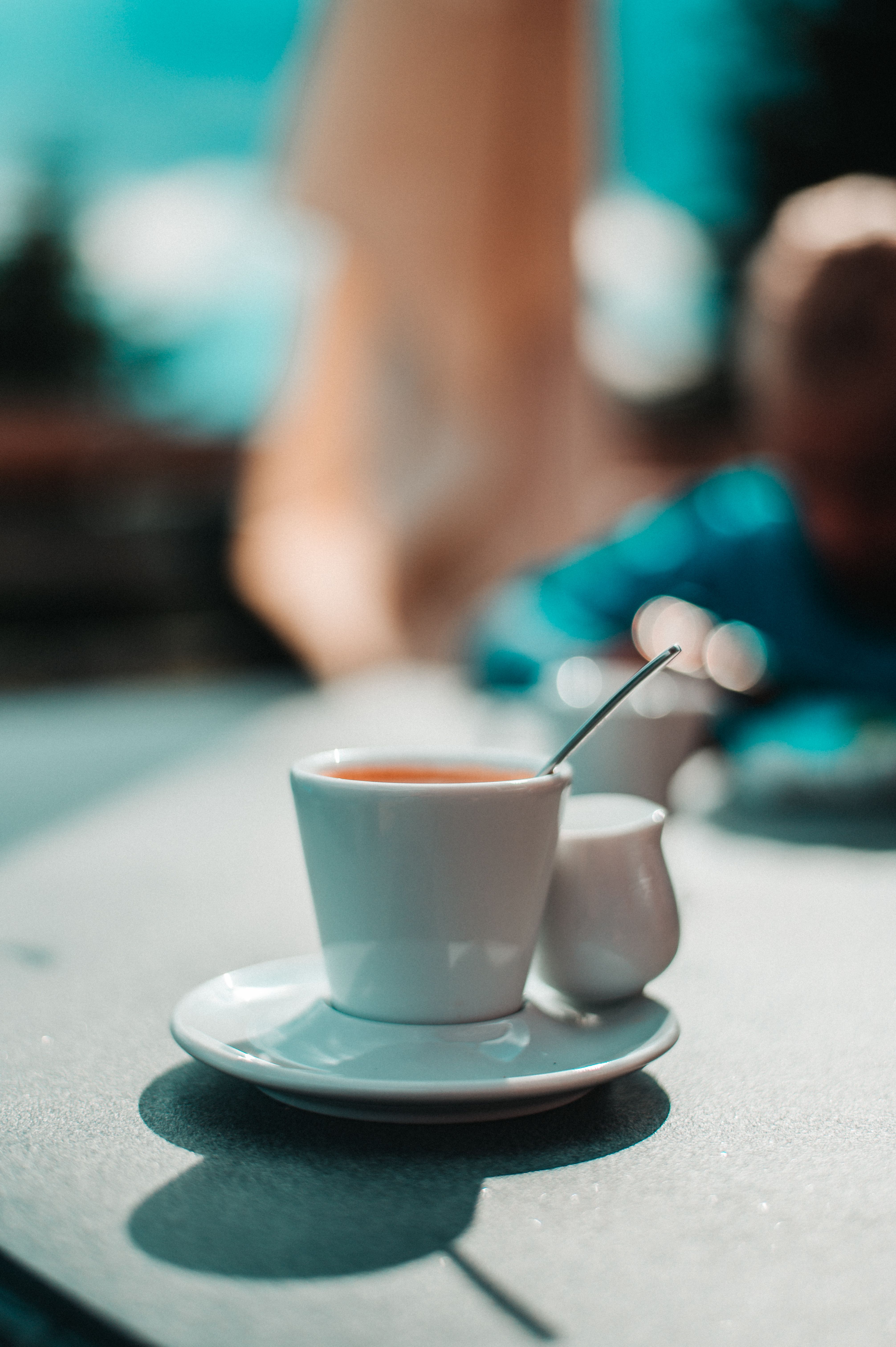 White Paper Cup on Top of Gray Marble Surface · Free Stock Photo