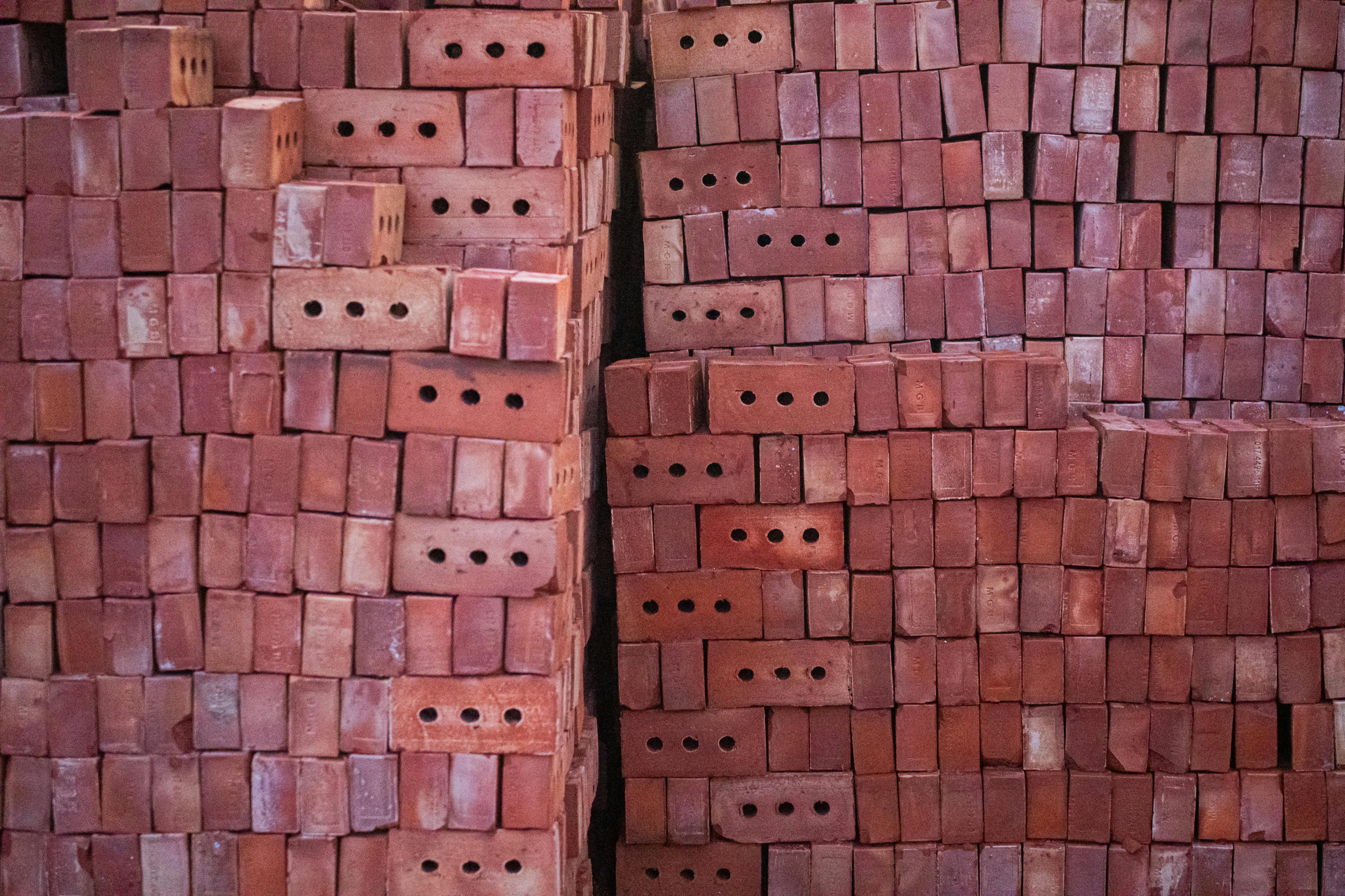 Stacked Red Bricks in Bangladesh Outdoor Setting · Free Stock Photo