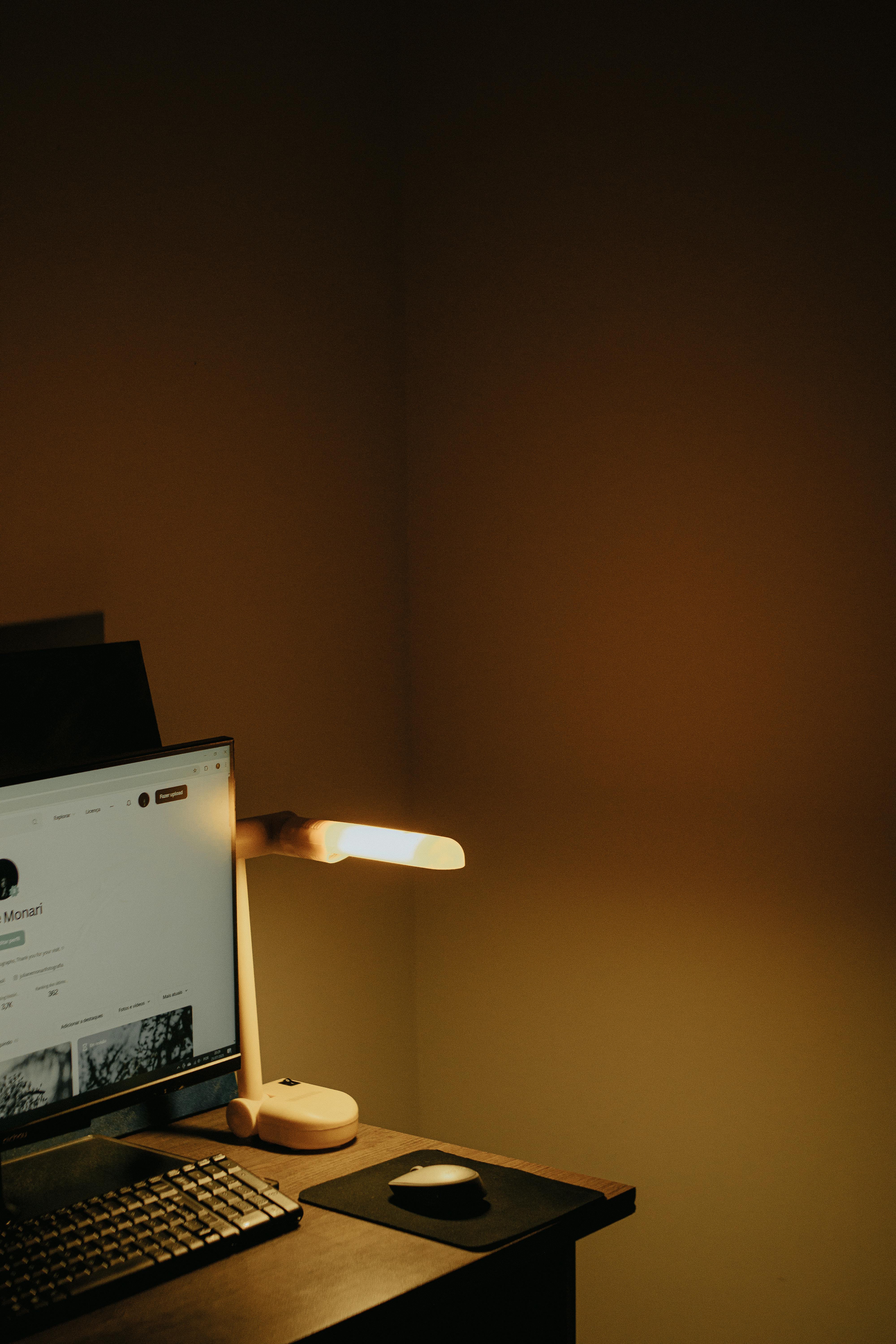 Cozy Desk Setup with Warm Lighting · Free Stock Photo