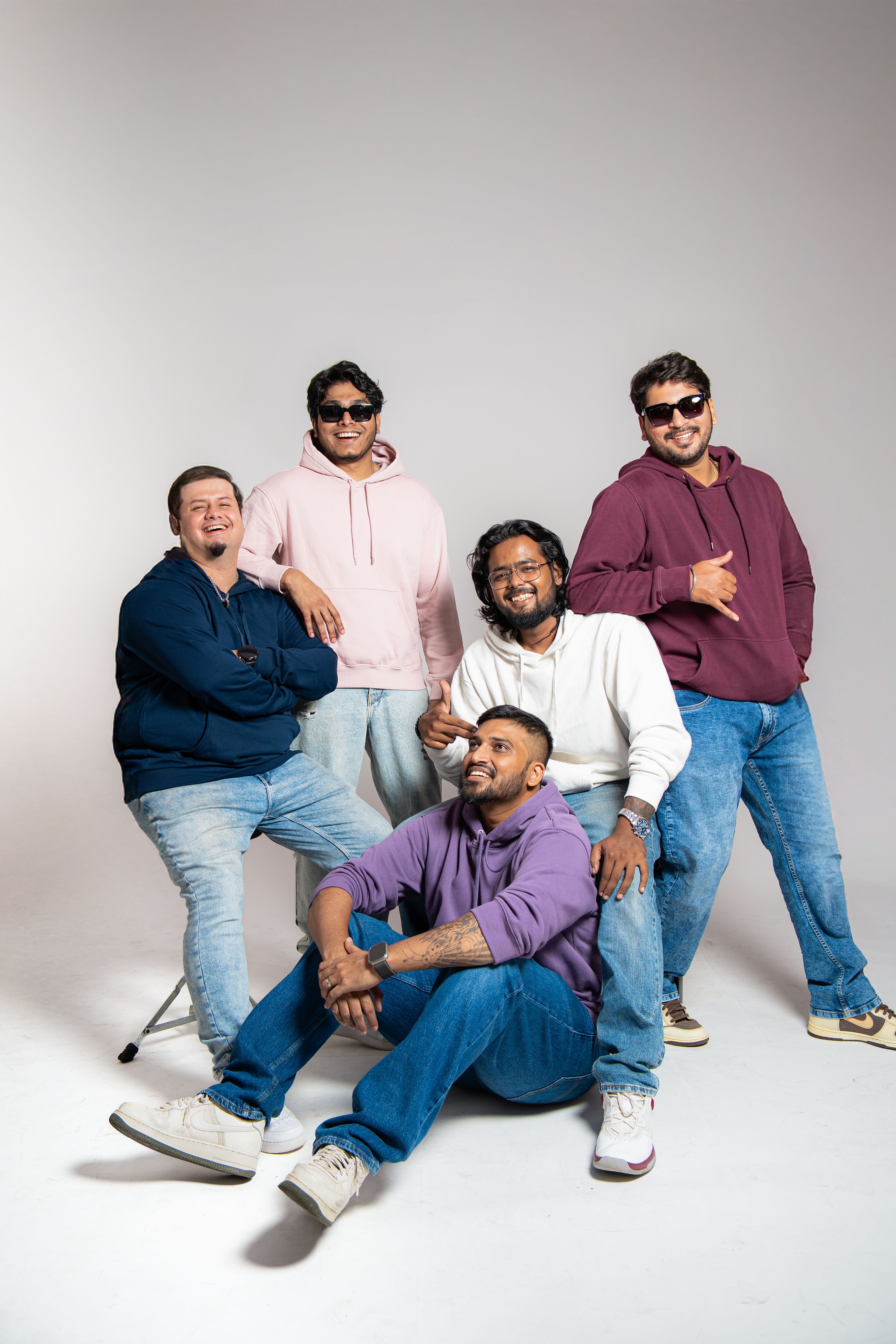 Casual Group Portrait of Five Friends in Studio · Free Stock Photo