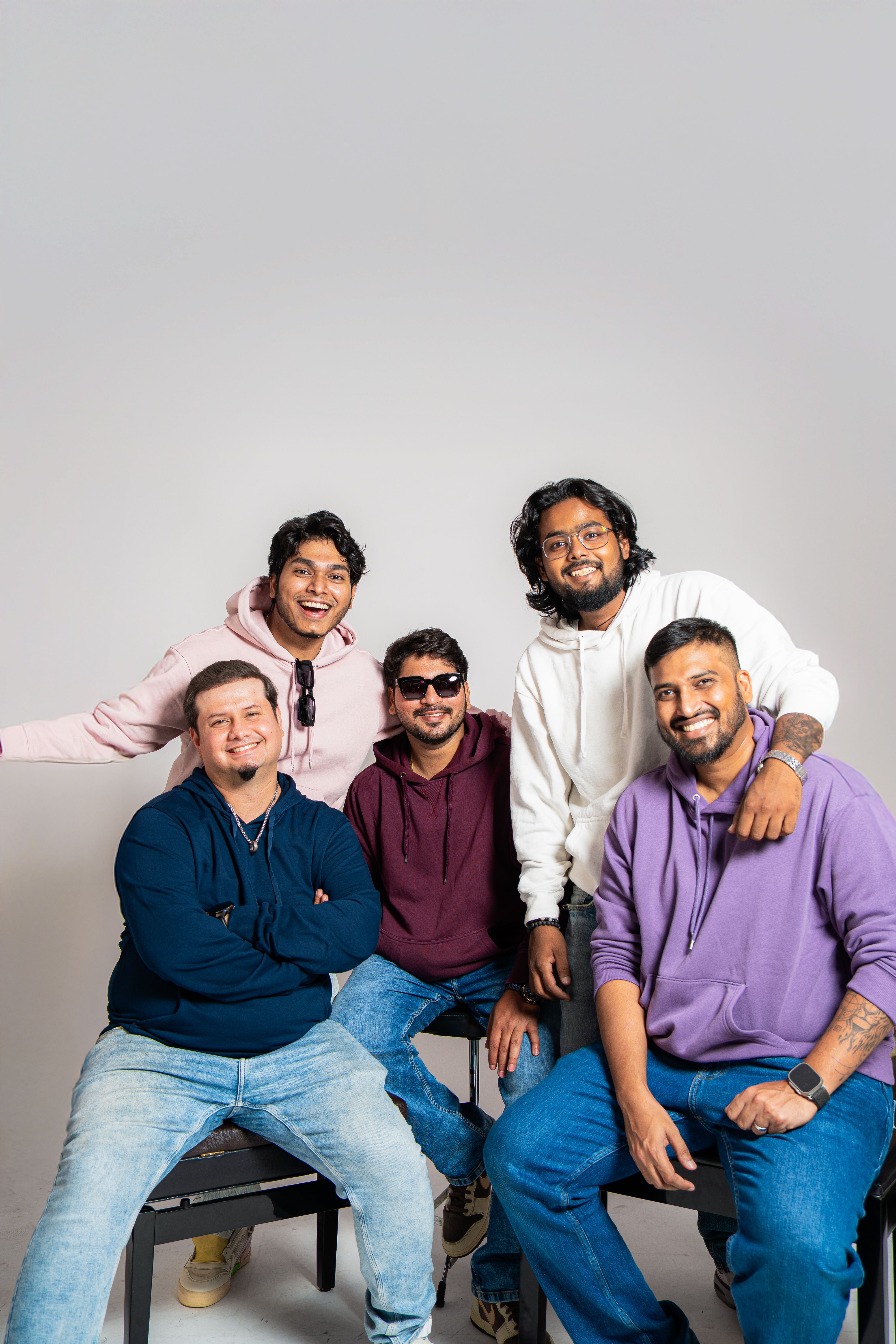 Diverse Group of Friends Posing in Studio · Free Stock Photo