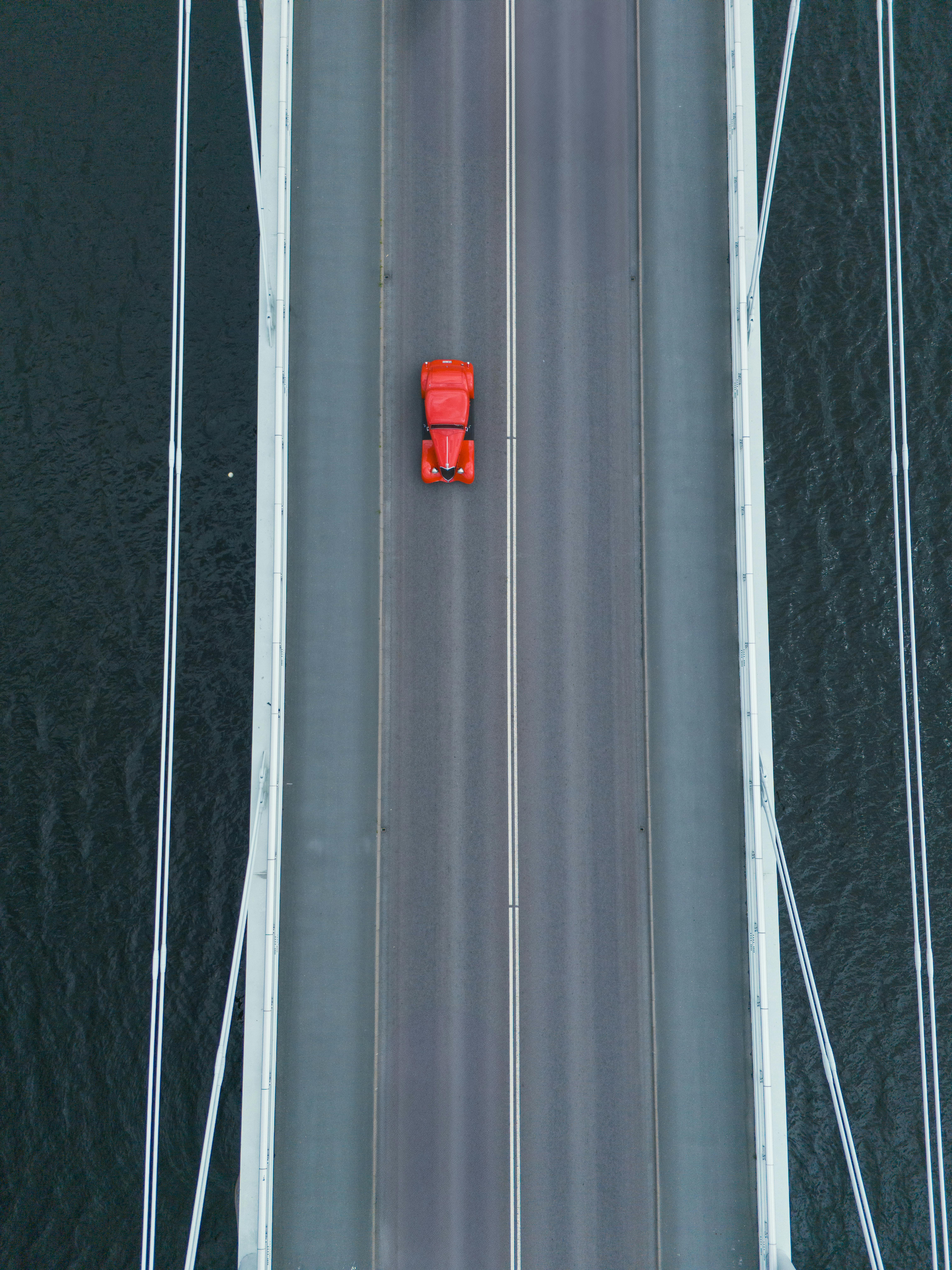 Aerial View of Red Car on Bridge in Jönköping · Free Stock Photo
