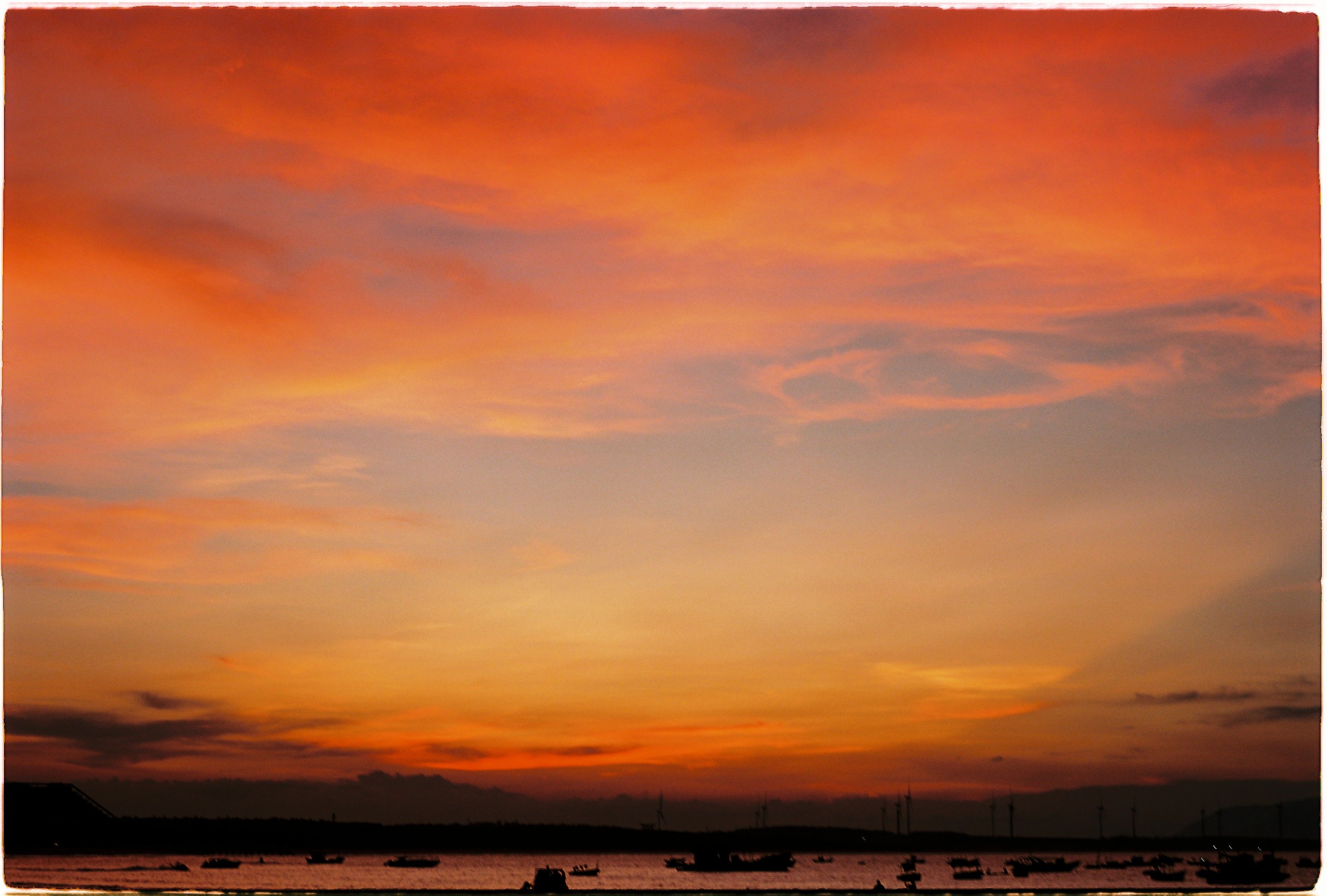 Stunning Orange and Pink Sunset Over Tranquil Sea · Free Stock Photo