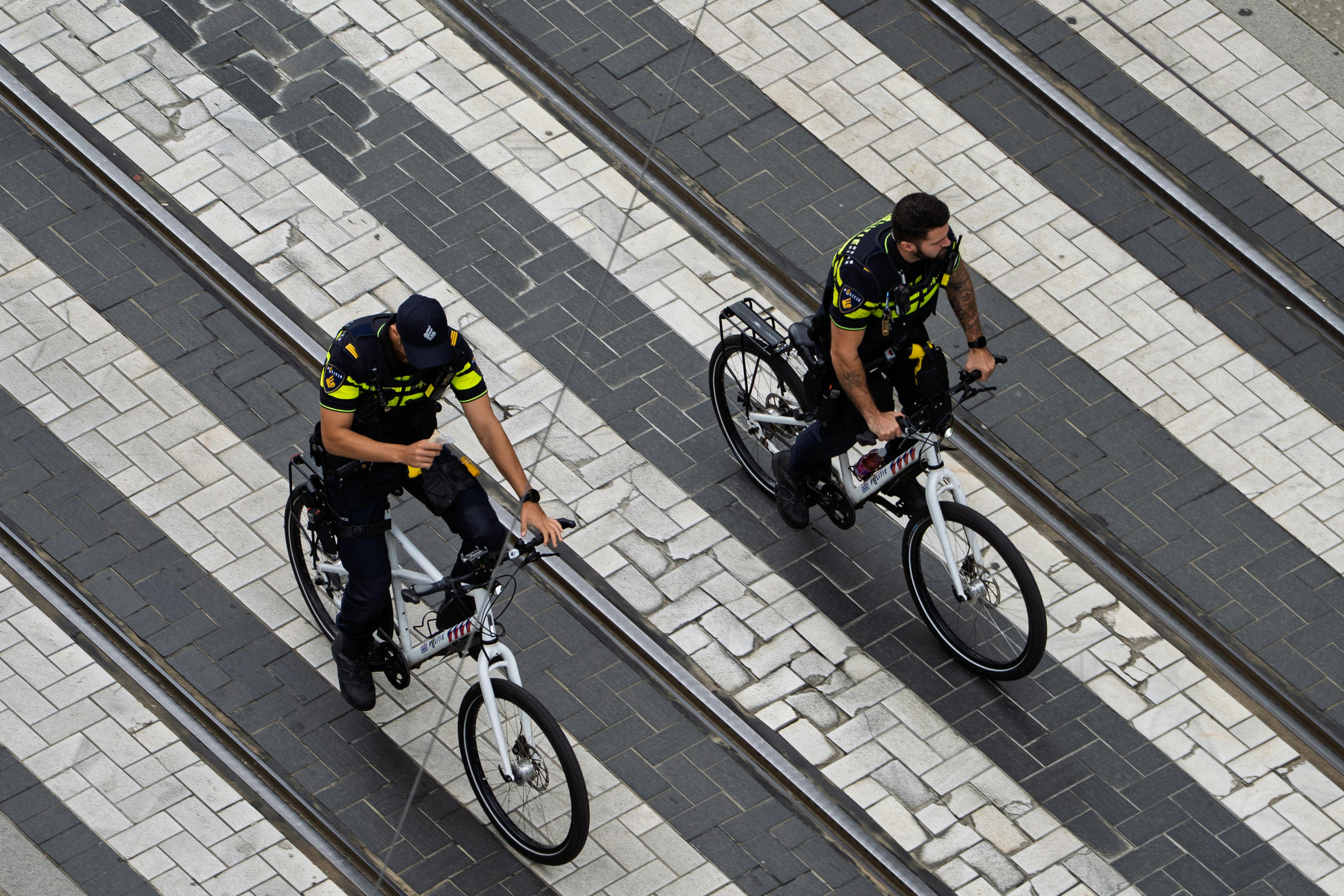 Bicycle Police Patrolling Urban Streets · Free Stock Photo