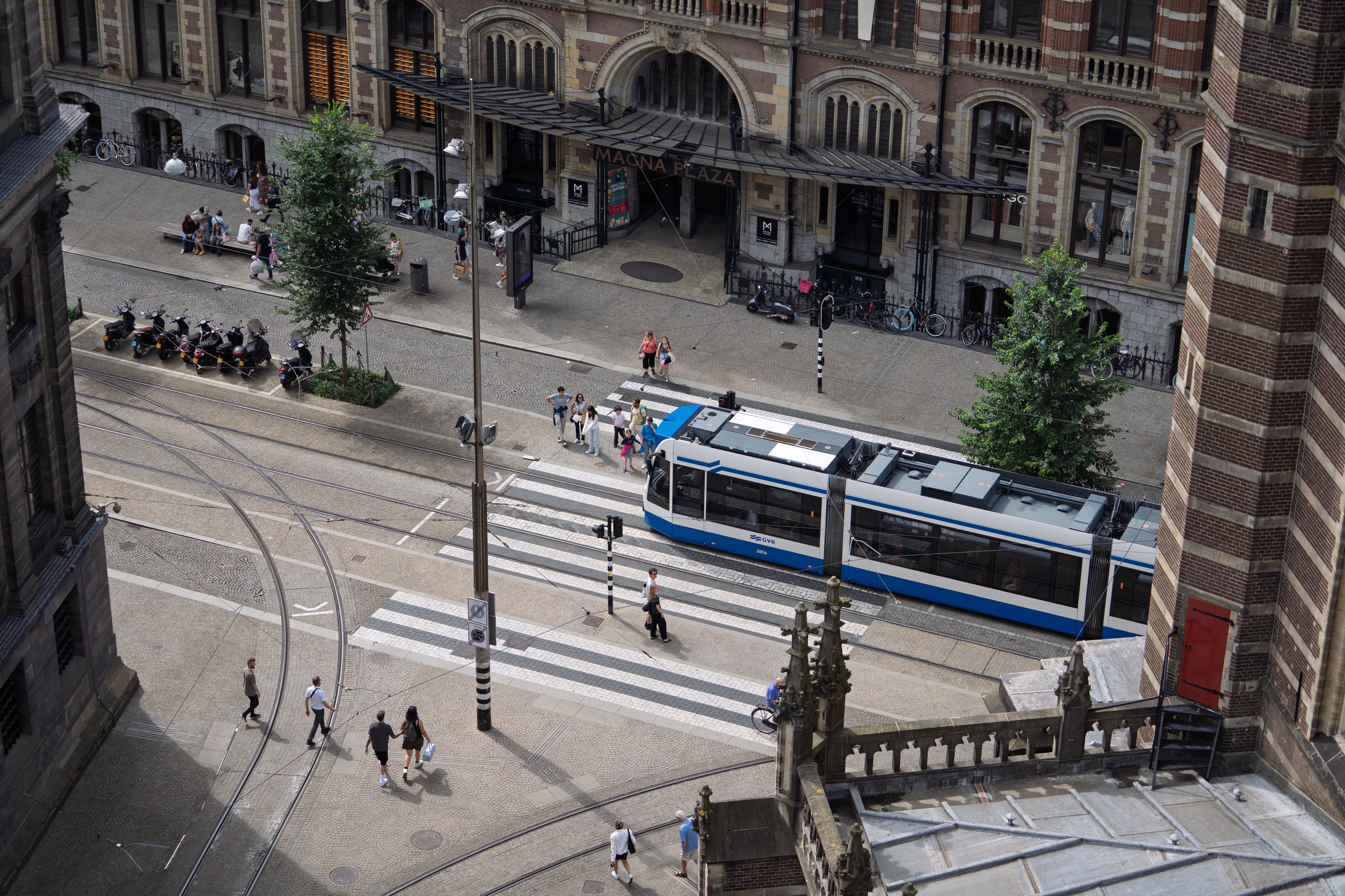 Aerial View of Busy Amsterdam Street with Tram · Free Stock Photo