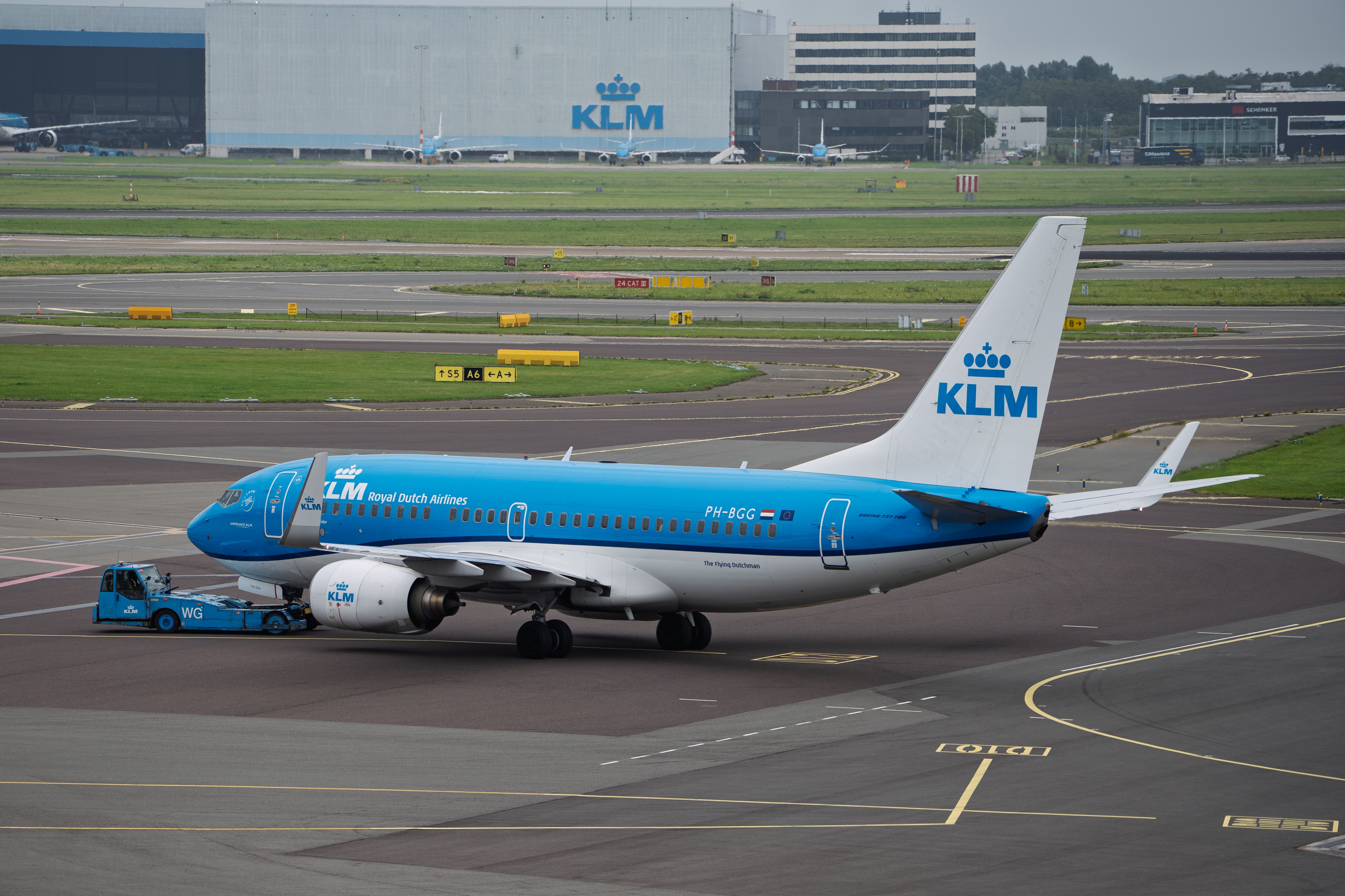 KLM Asia Airplane at Airport Terminal · Free Stock Photo