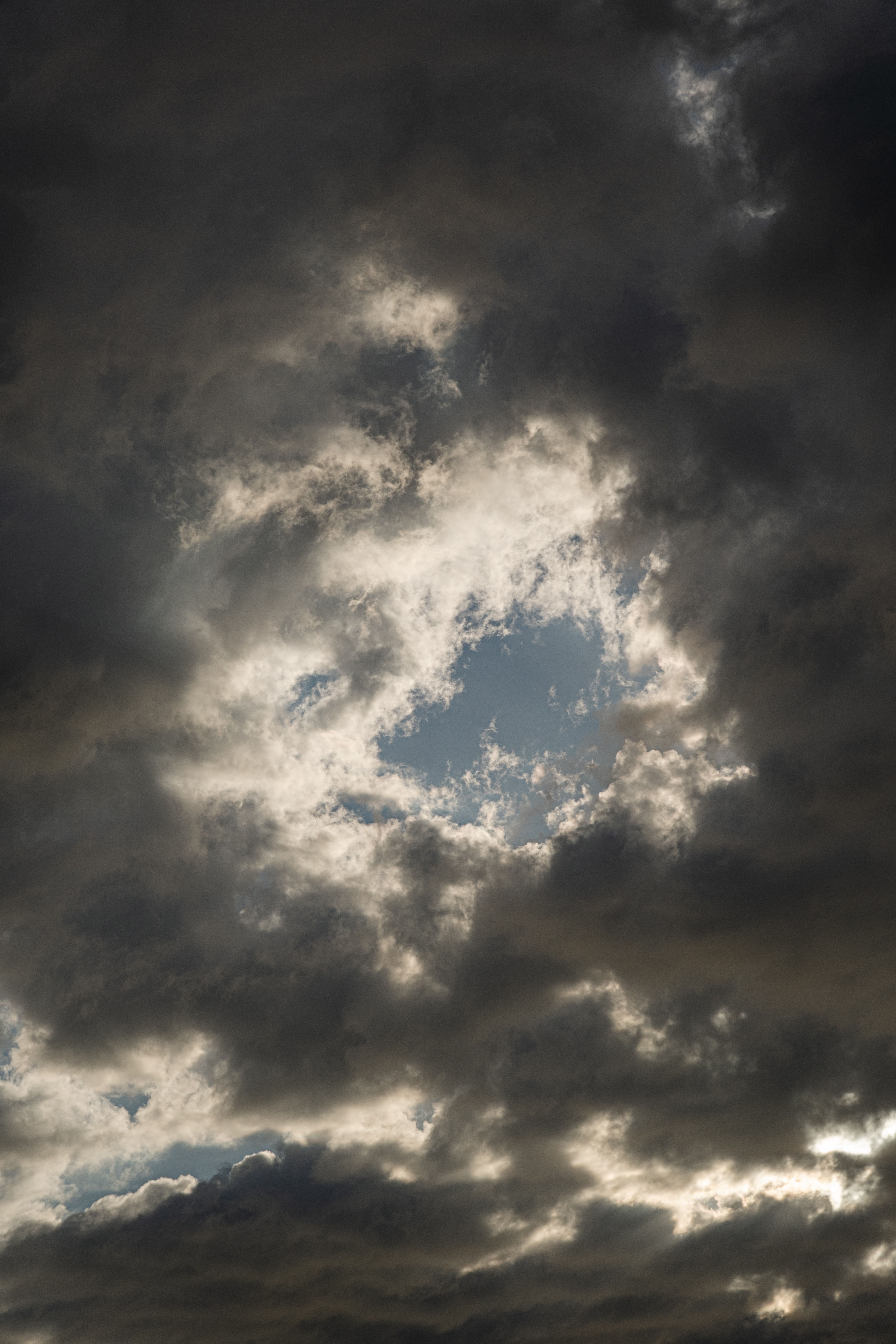 Dramatic Cloudy Sky with Sunlight Breaking Through · Free Stock Photo