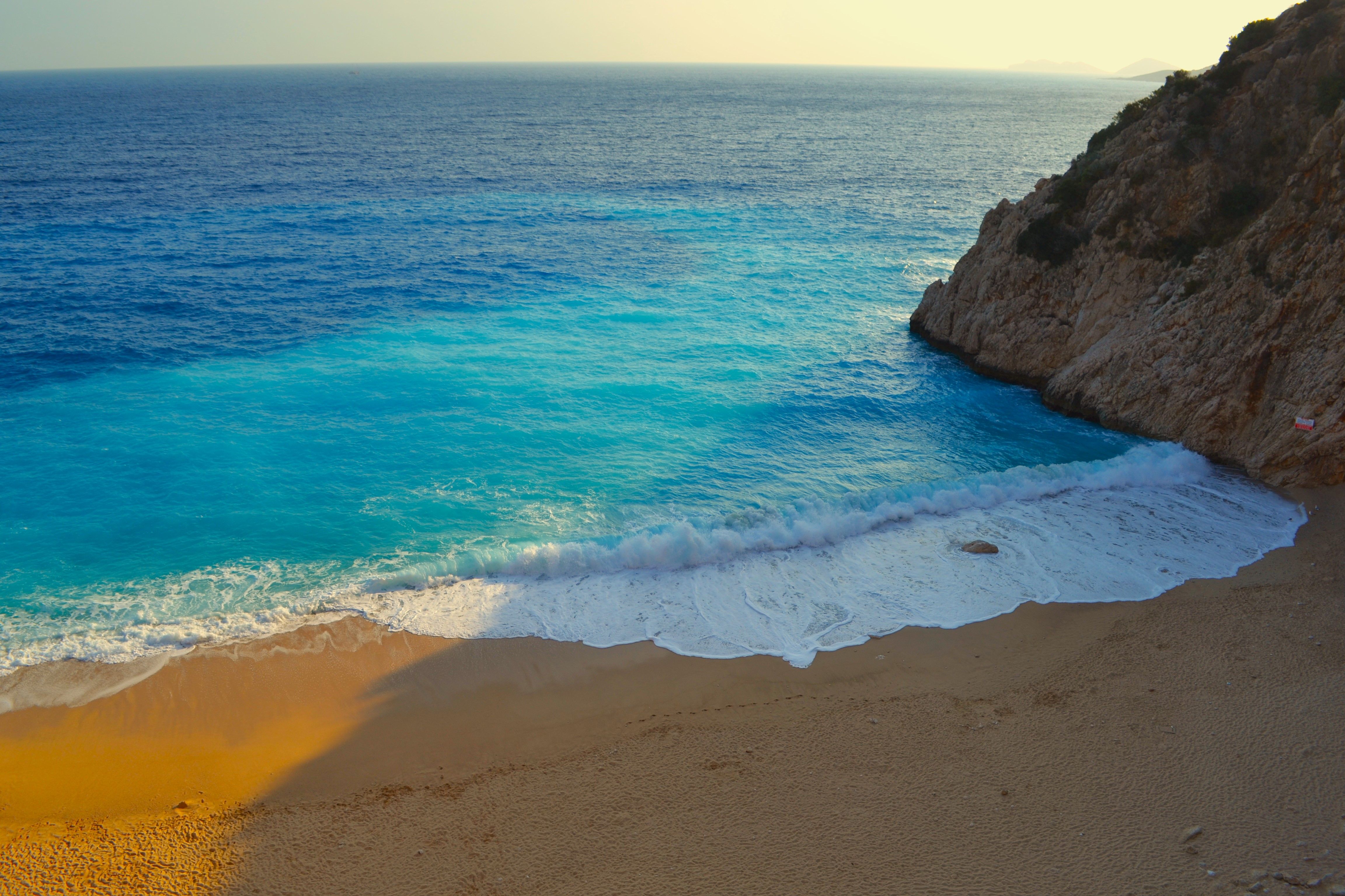 Breathtaking Coastal Beach View at Sunset · Free Stock Photo