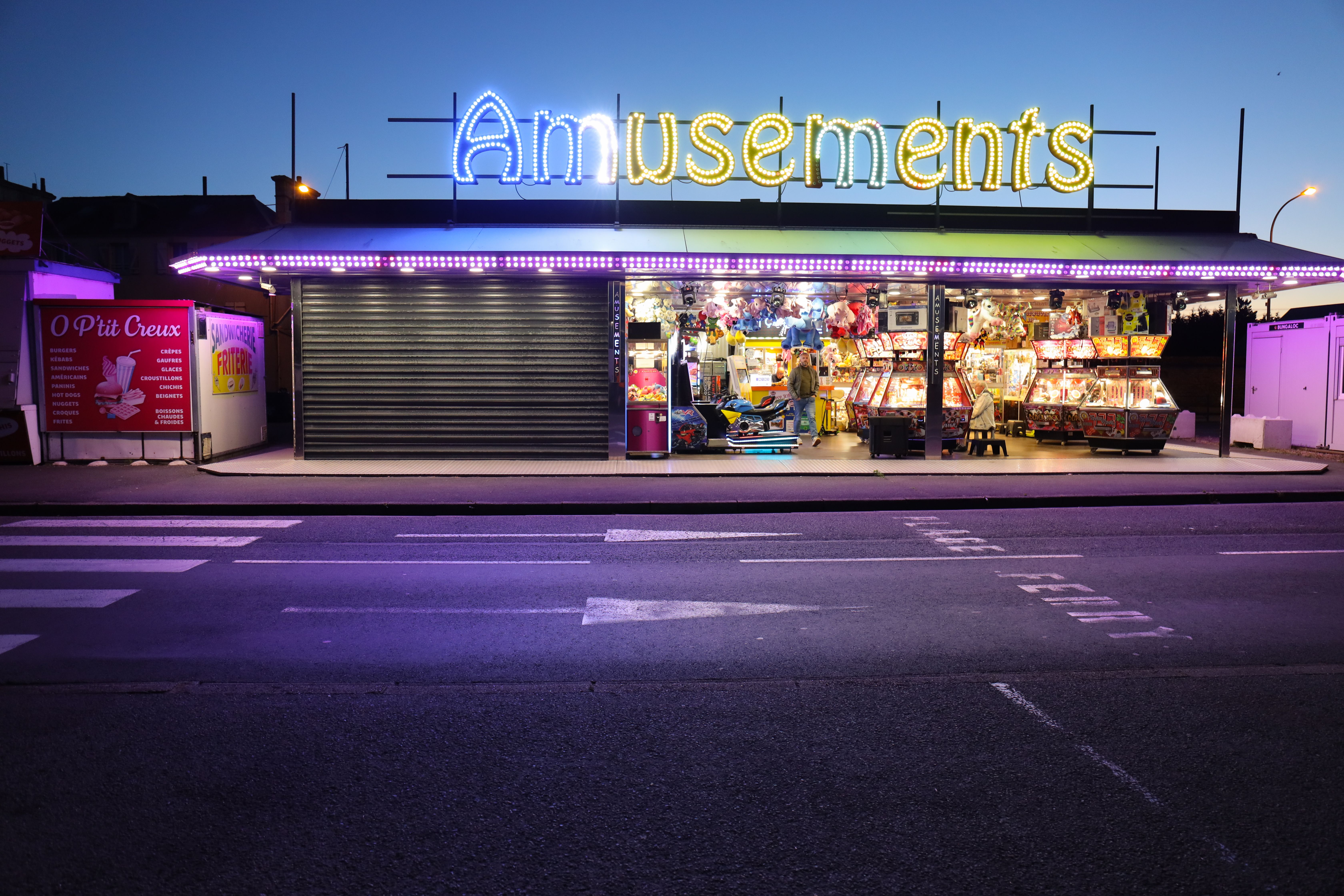Colorful Amusement Arcade at Night in Normandy · Free Stock Photo
