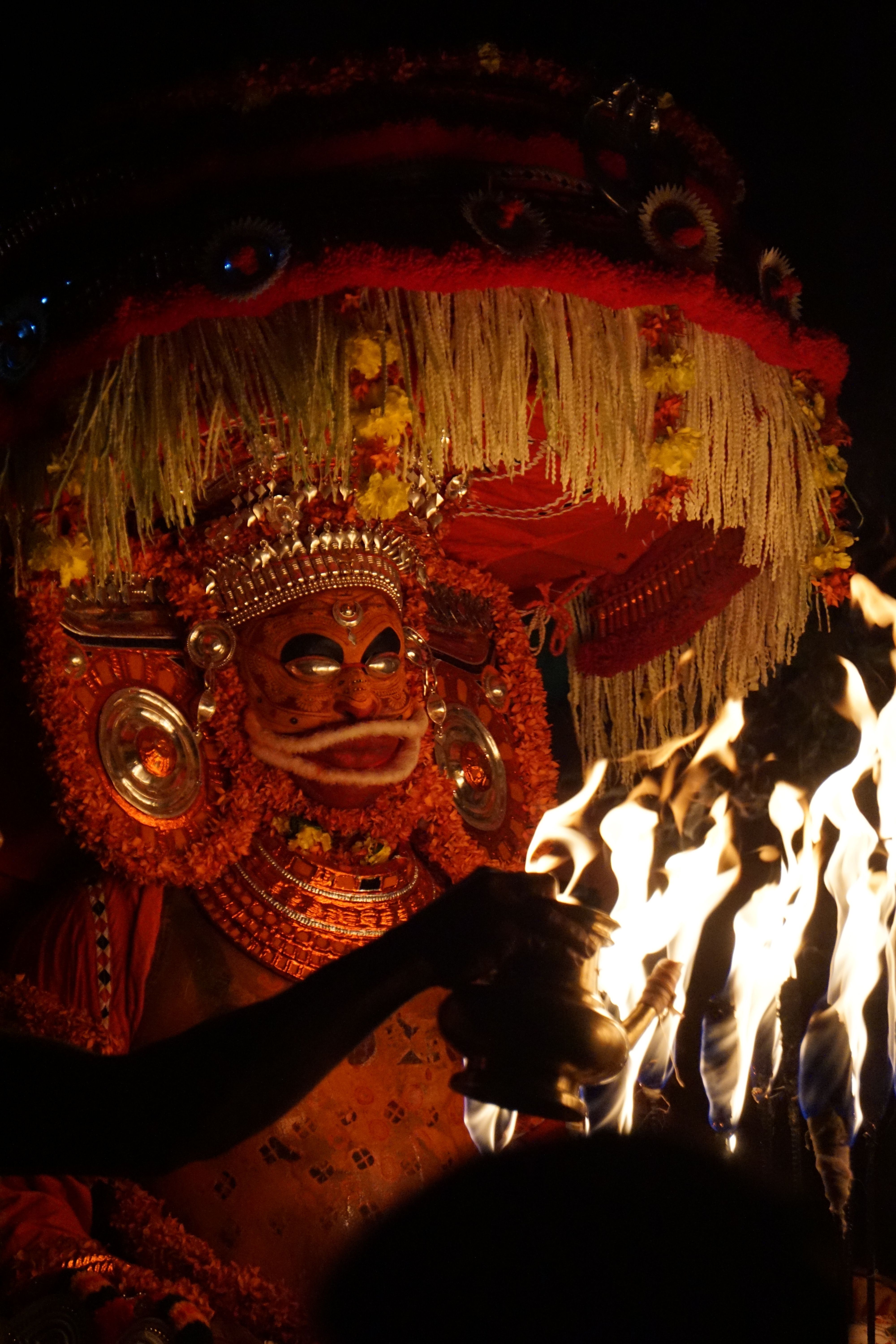 Traditional Theyyam Performer at Night Ceremony · Free Stock Photo