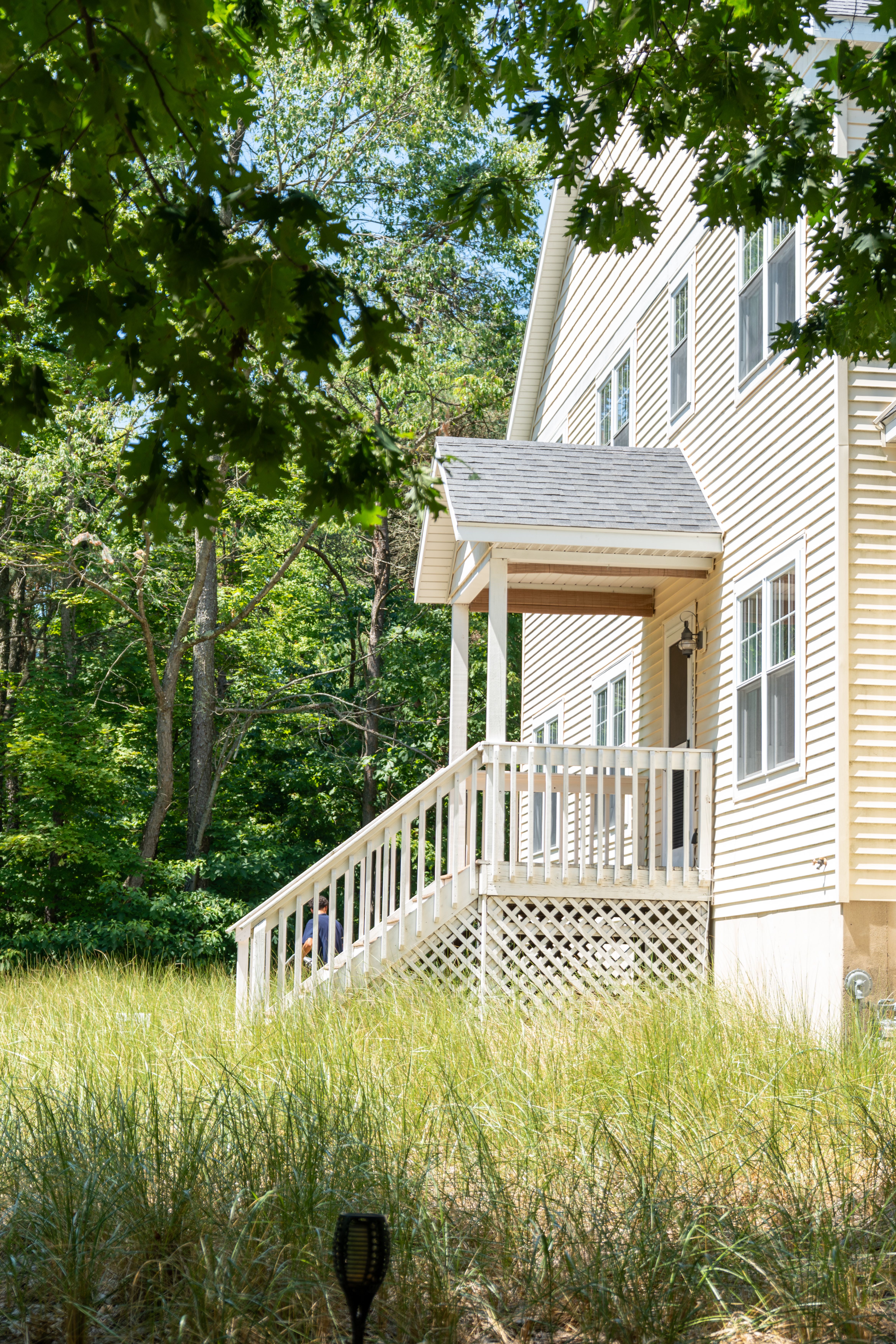 Charming Suburban Home with Sunny Porch · Free Stock Photo