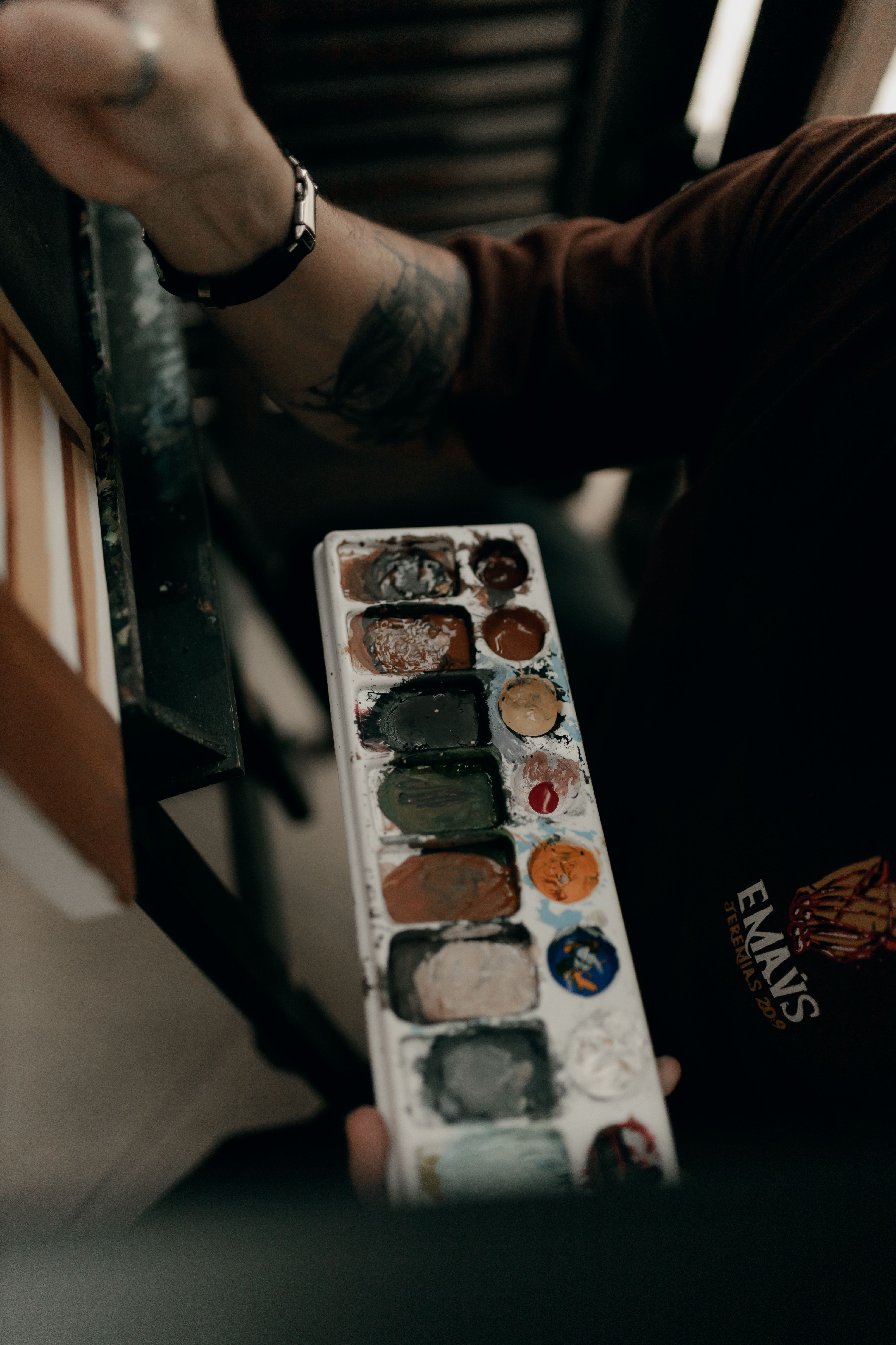 Artist Holding Paint Palette in Studio · Free Stock Photo