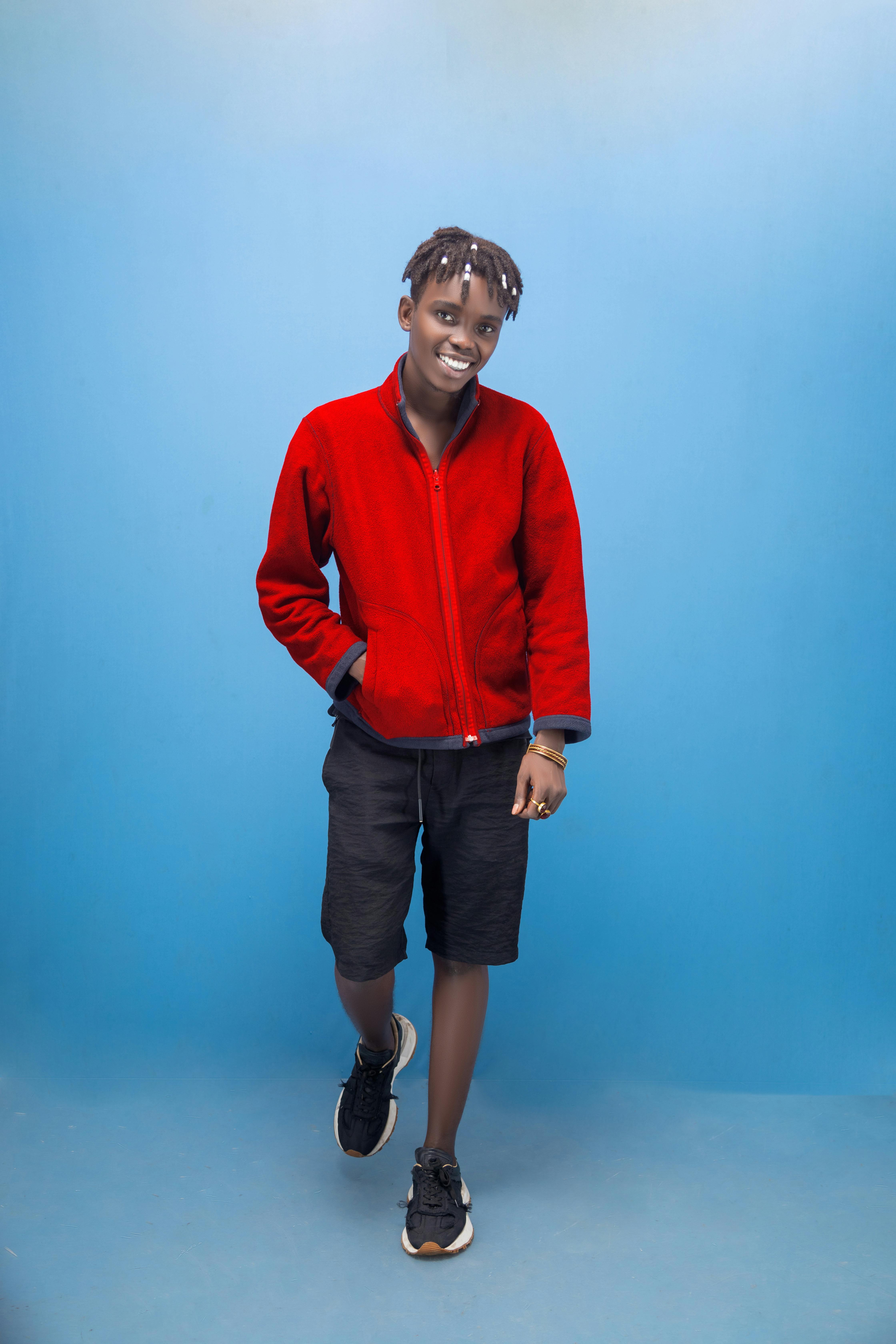 Fashionable Young Man in Red Jacket Posing · Free Stock Photo