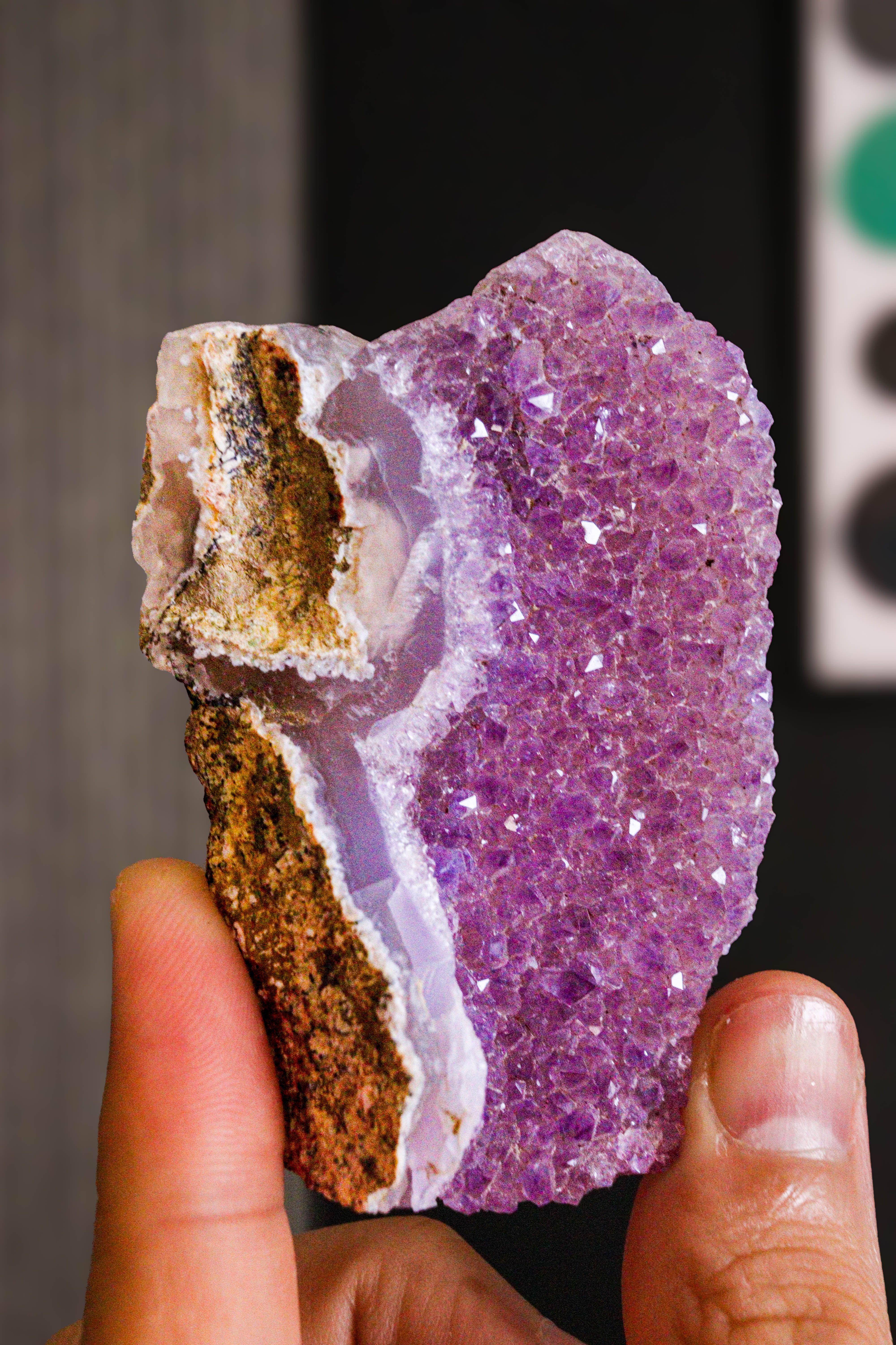 Close-up of Hand Holding Amethyst Geode Crystal · Free Stock Photo