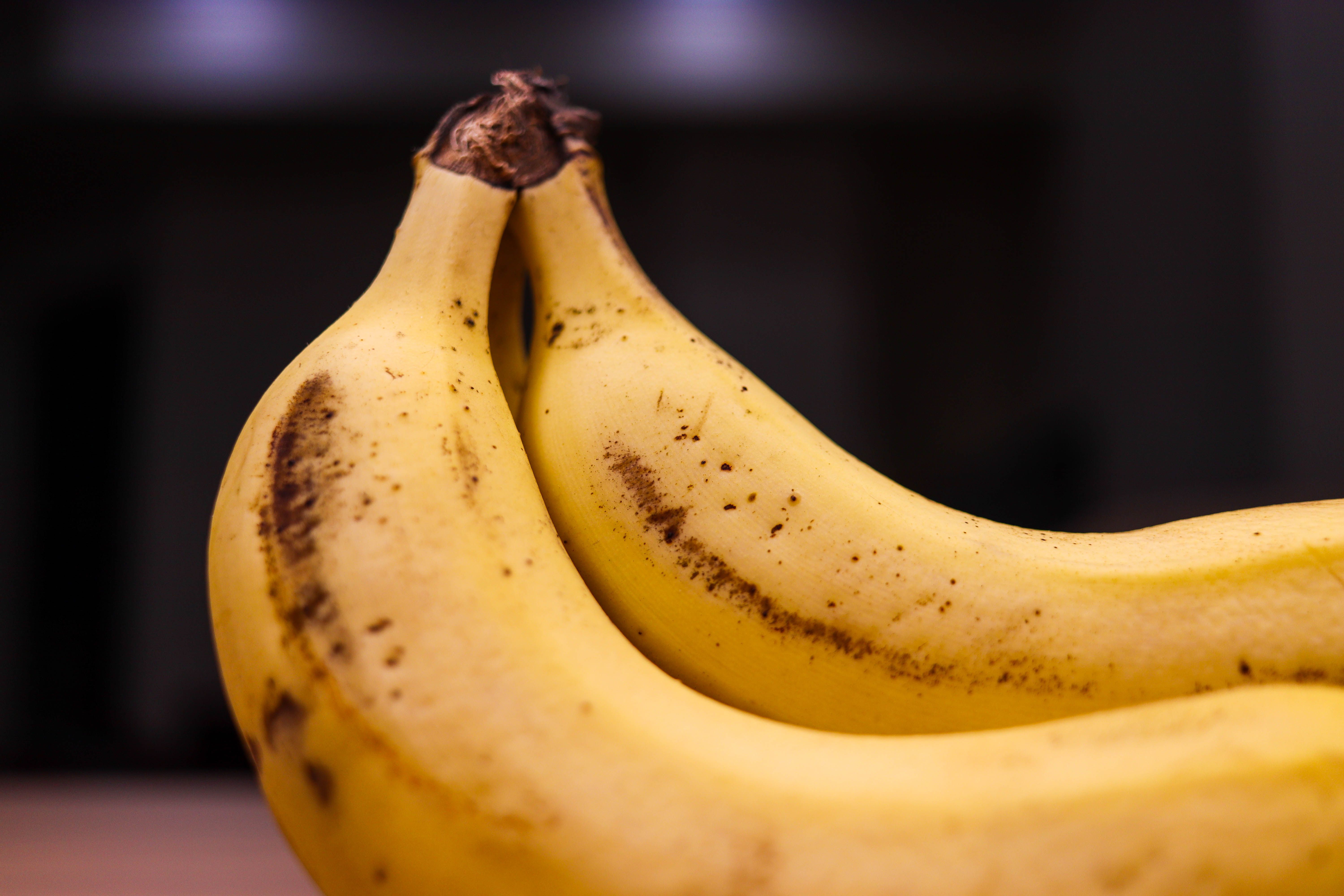 Close-Up of Ripe Bananas in Soft Light · Free Stock Photo