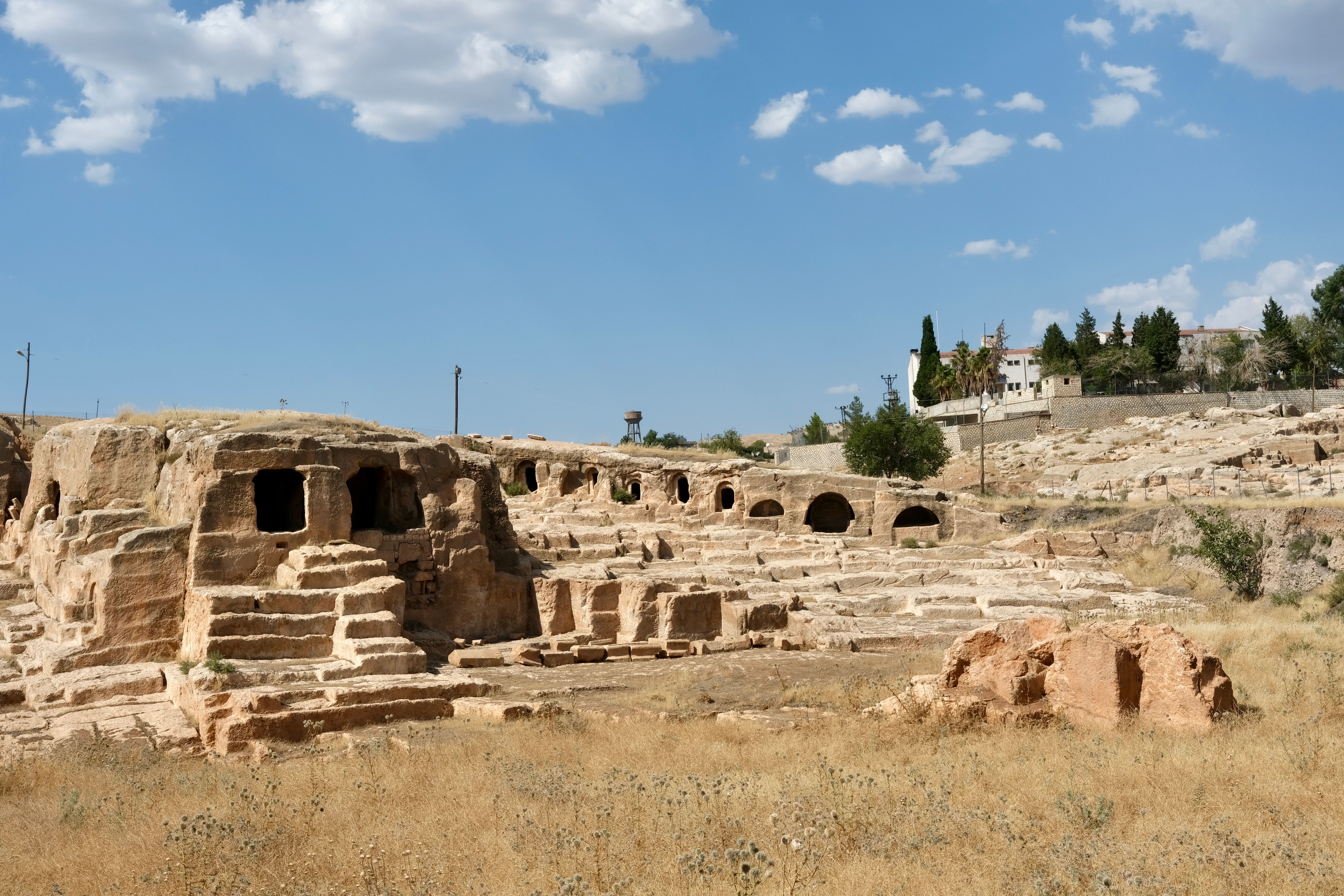 Ancient Cave Dwellings in Arid Landscape · Free Stock Photo