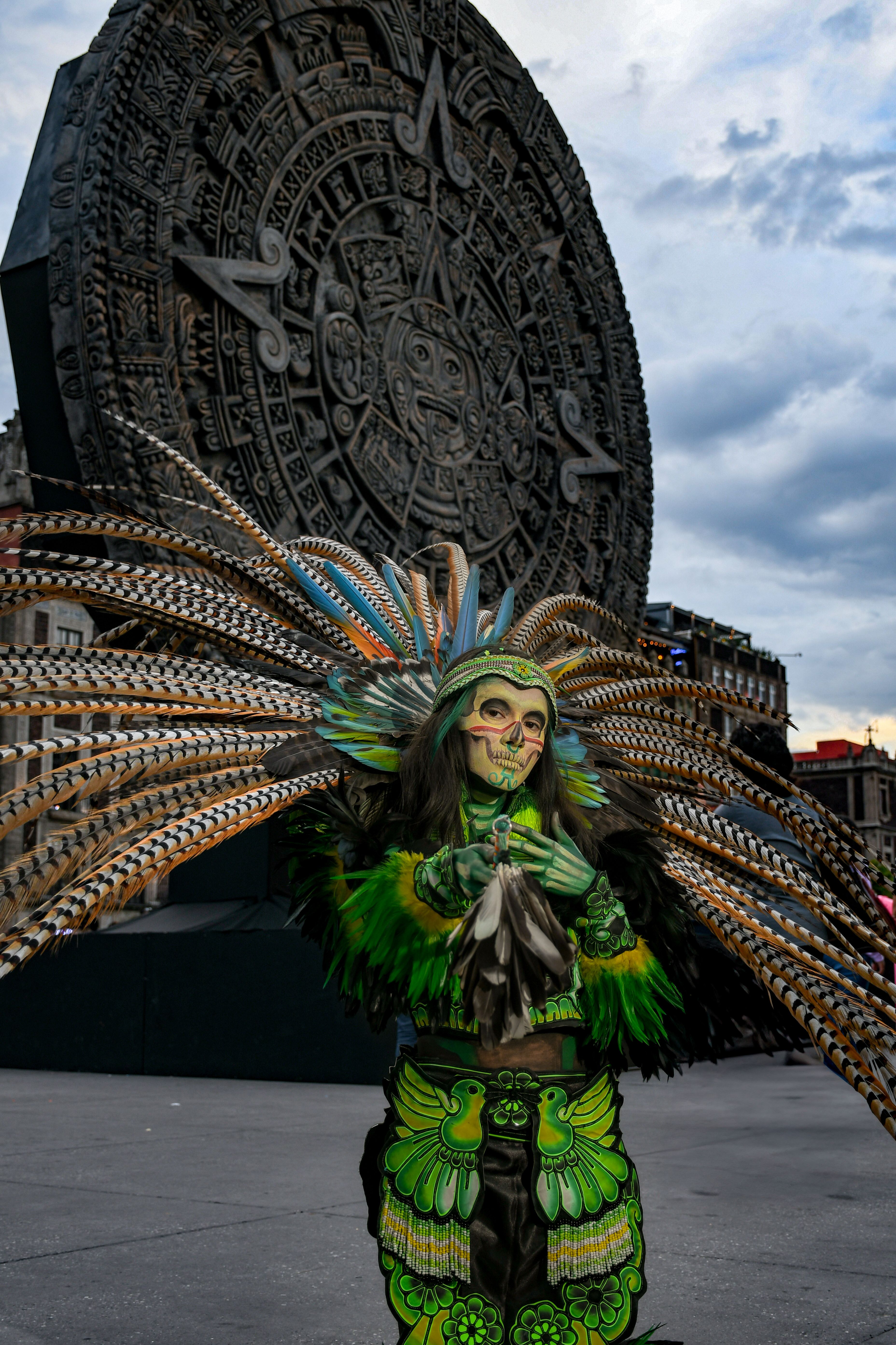Traditional Aztec Costume in Urban Setting · Free Stock Photo