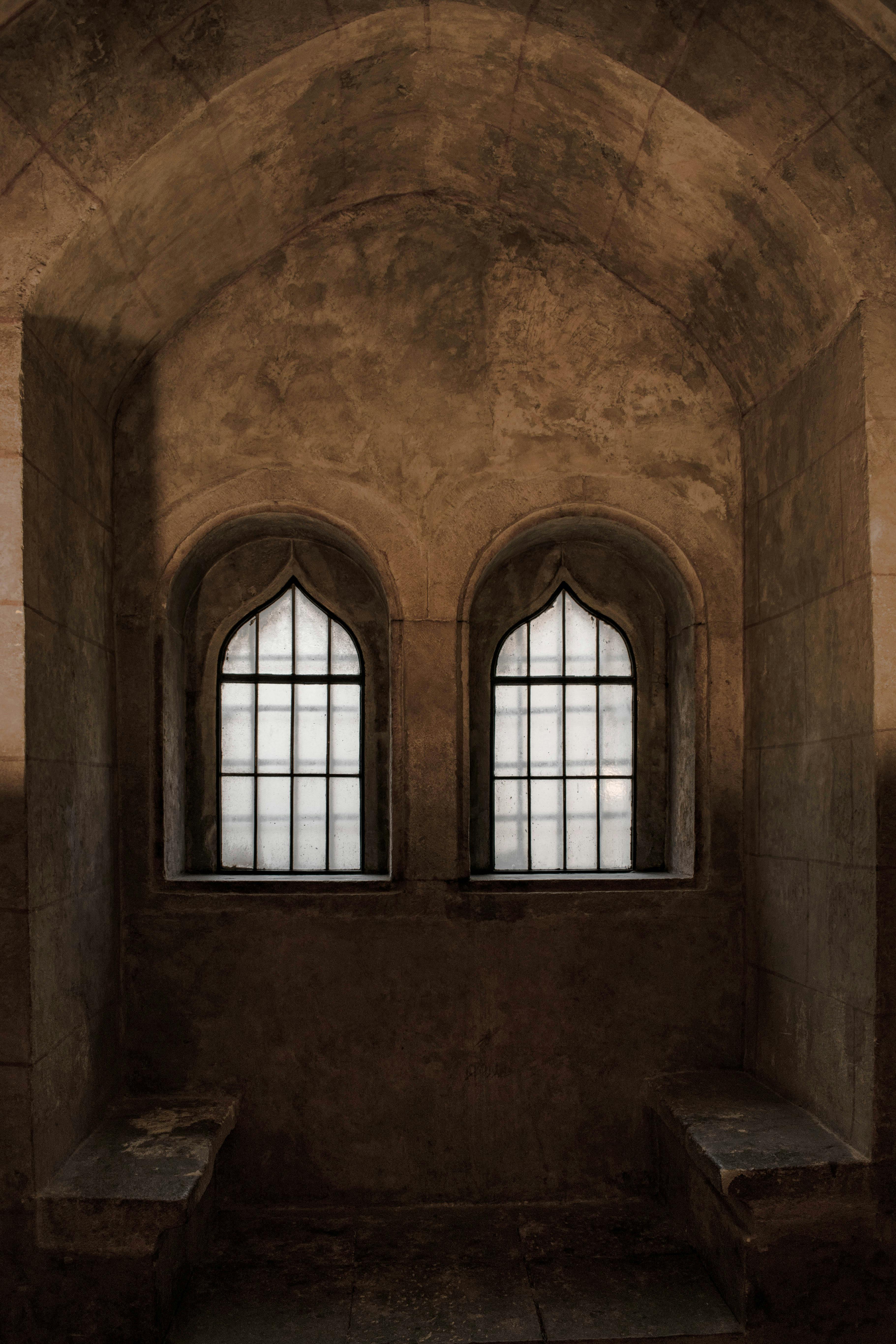 Gothic Arched Windows in Historical Setting · Free Stock Photo