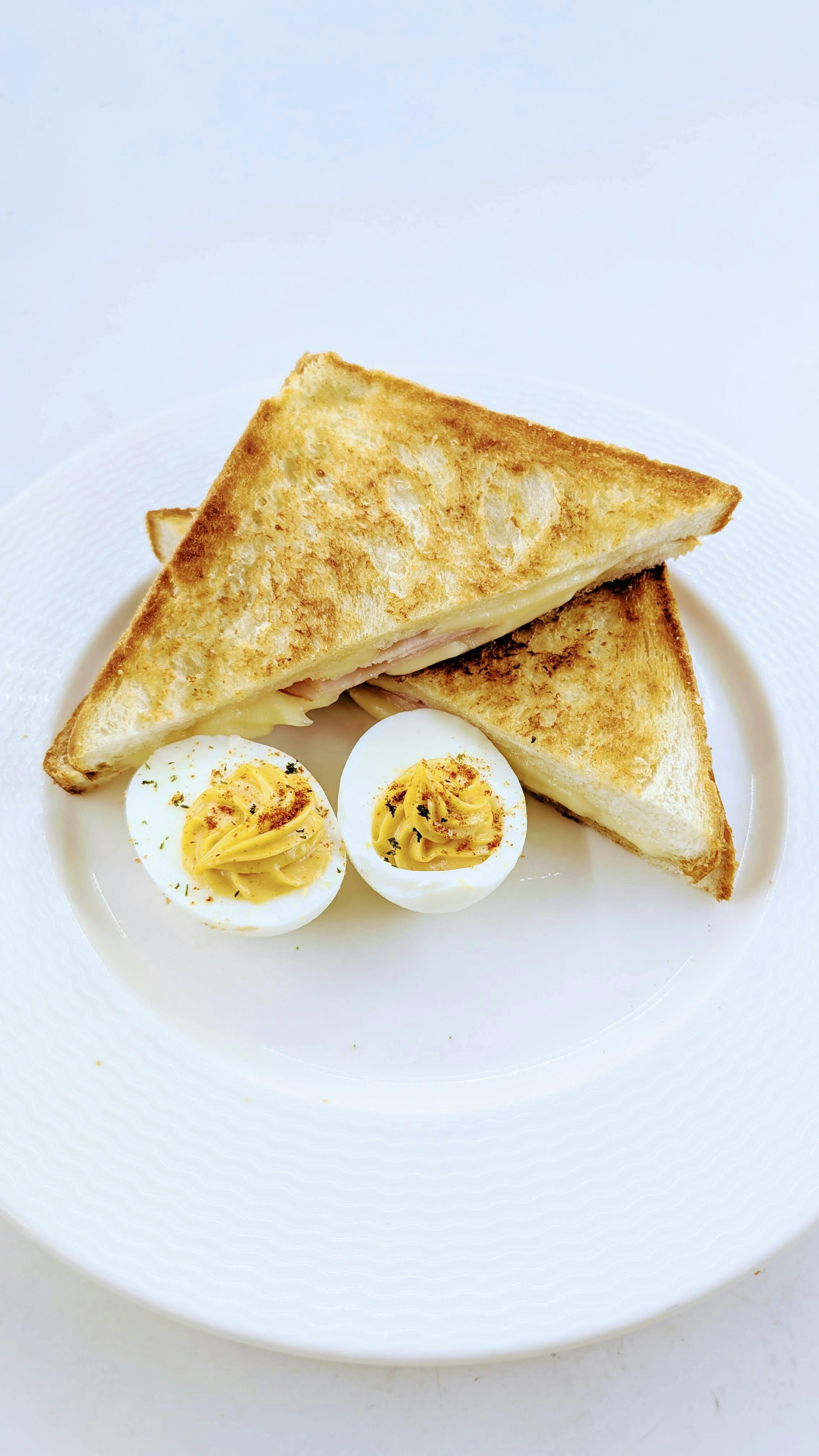 Delicious Breakfast with Toast and Deviled Eggs · Free Stock Photo