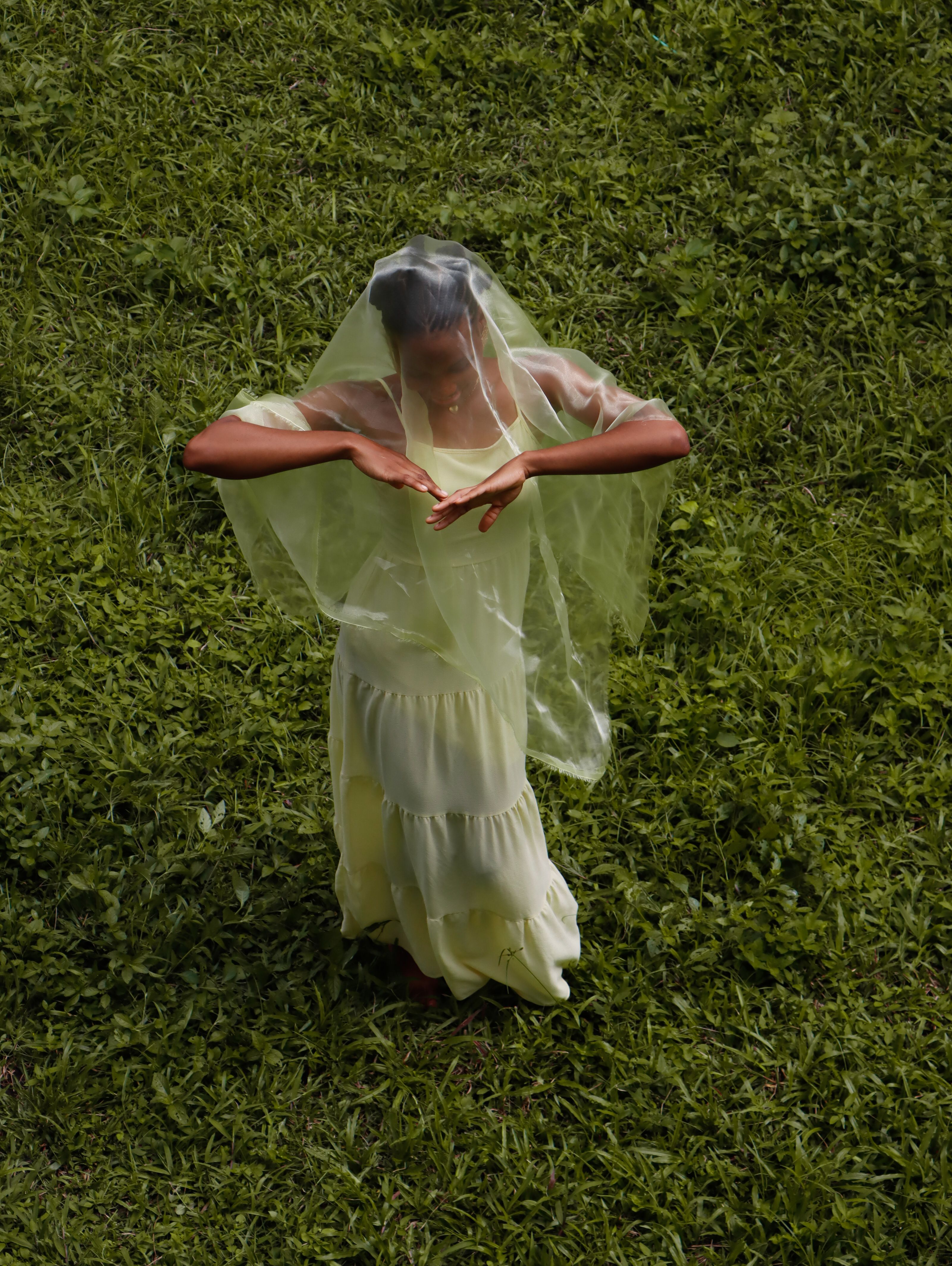 Graceful Woman Dancing in a Field of Green · Free Stock Photo