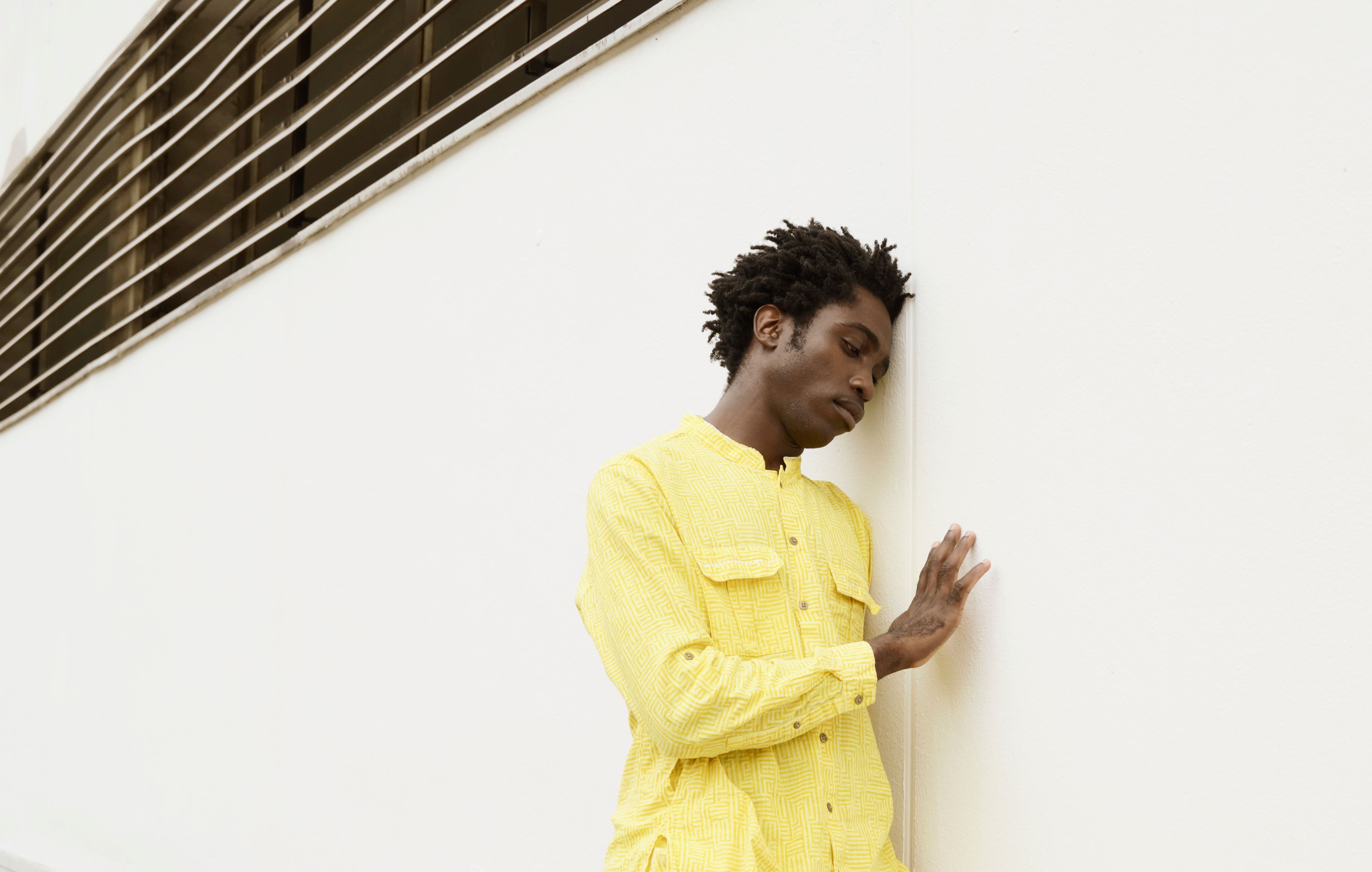 Elegant Portrait Against Minimalist Architecture · Free Stock Photo
