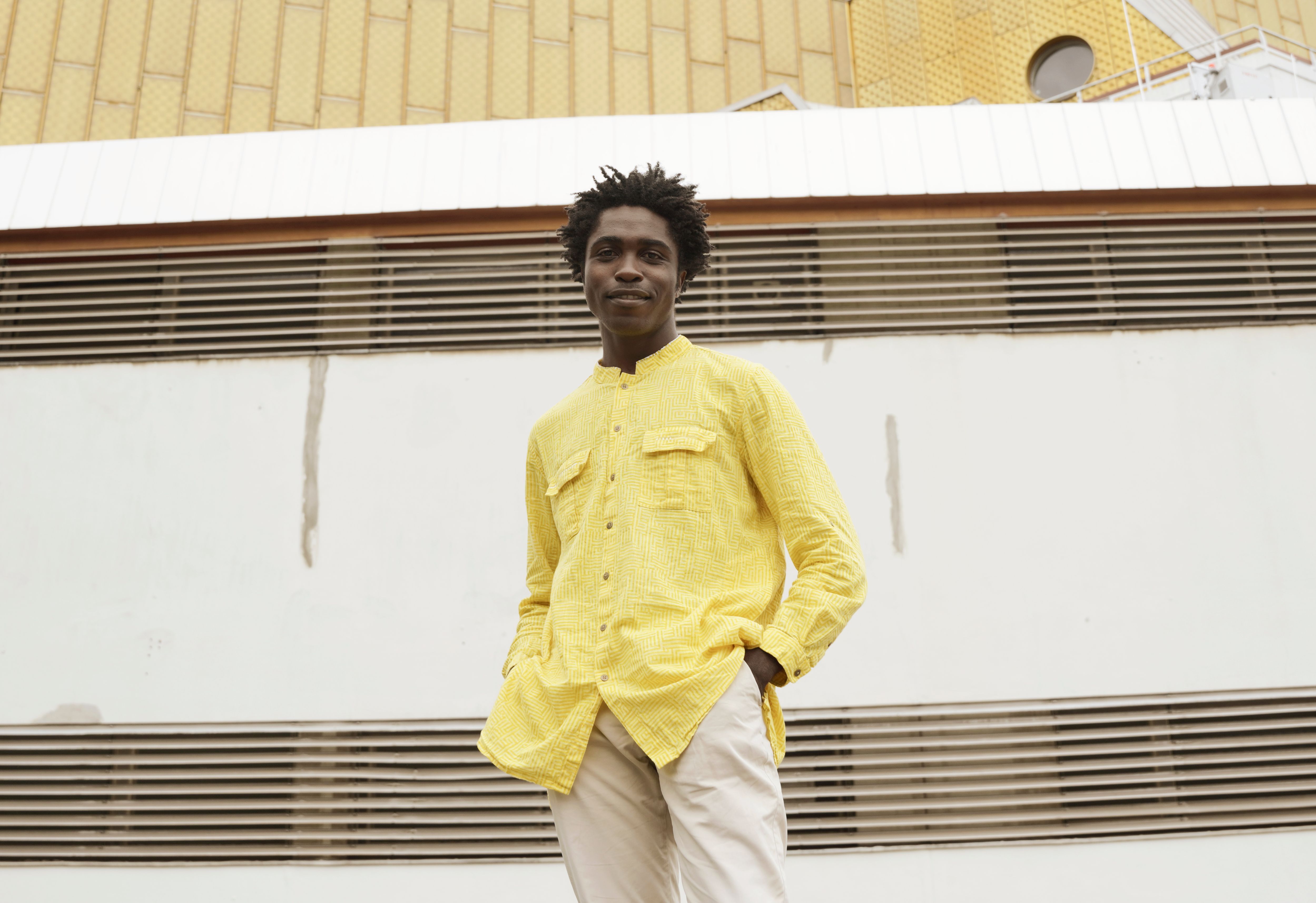 Stylish Portrait in Front of Modern Architecture · Free Stock Photo