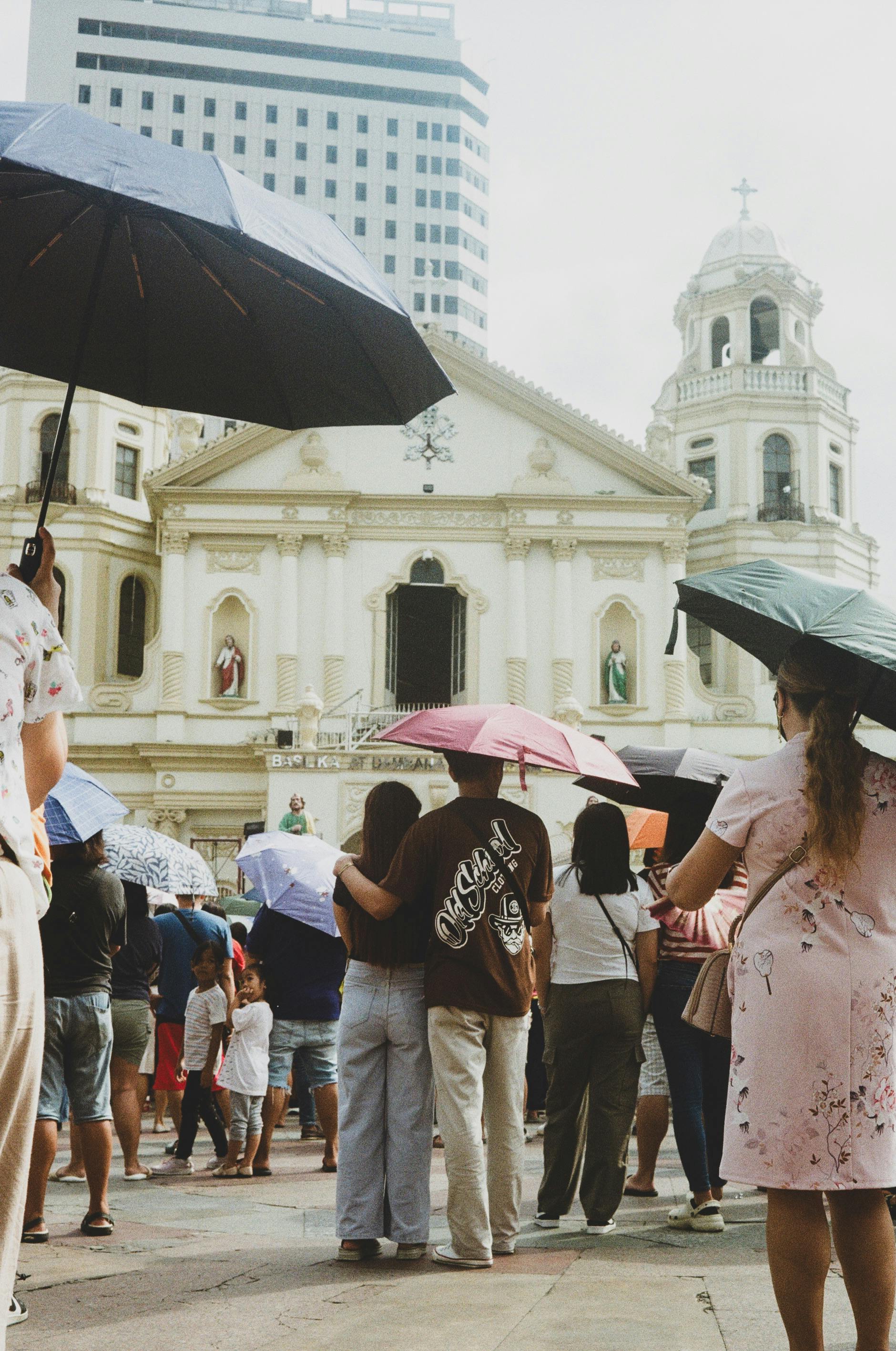 Crowd with Umbrellas Outside Quiapo Church, Manila · Free Stock Photo