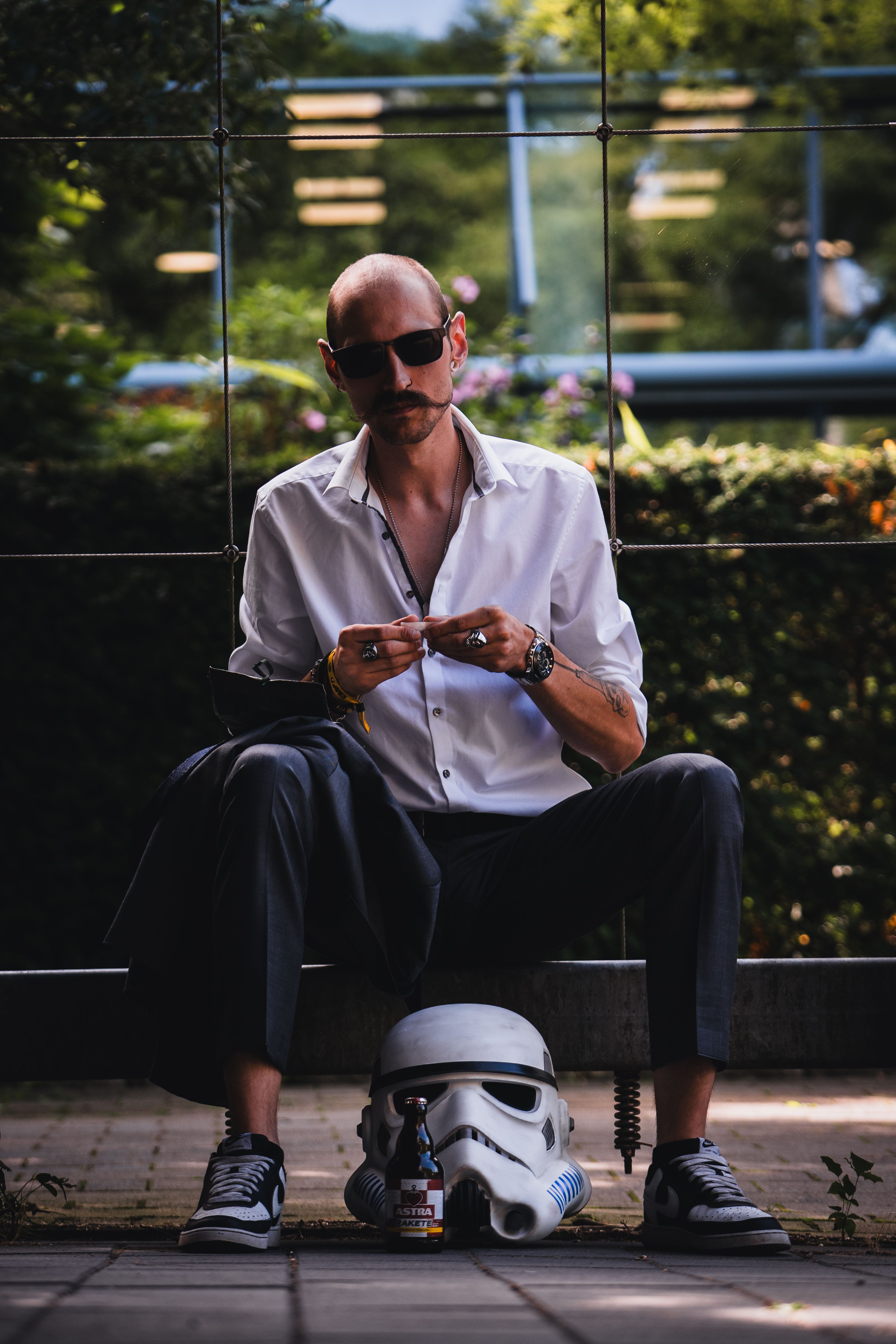 Fashionable Man with Stormtrooper Helmet Outdoors · Free Stock Photo