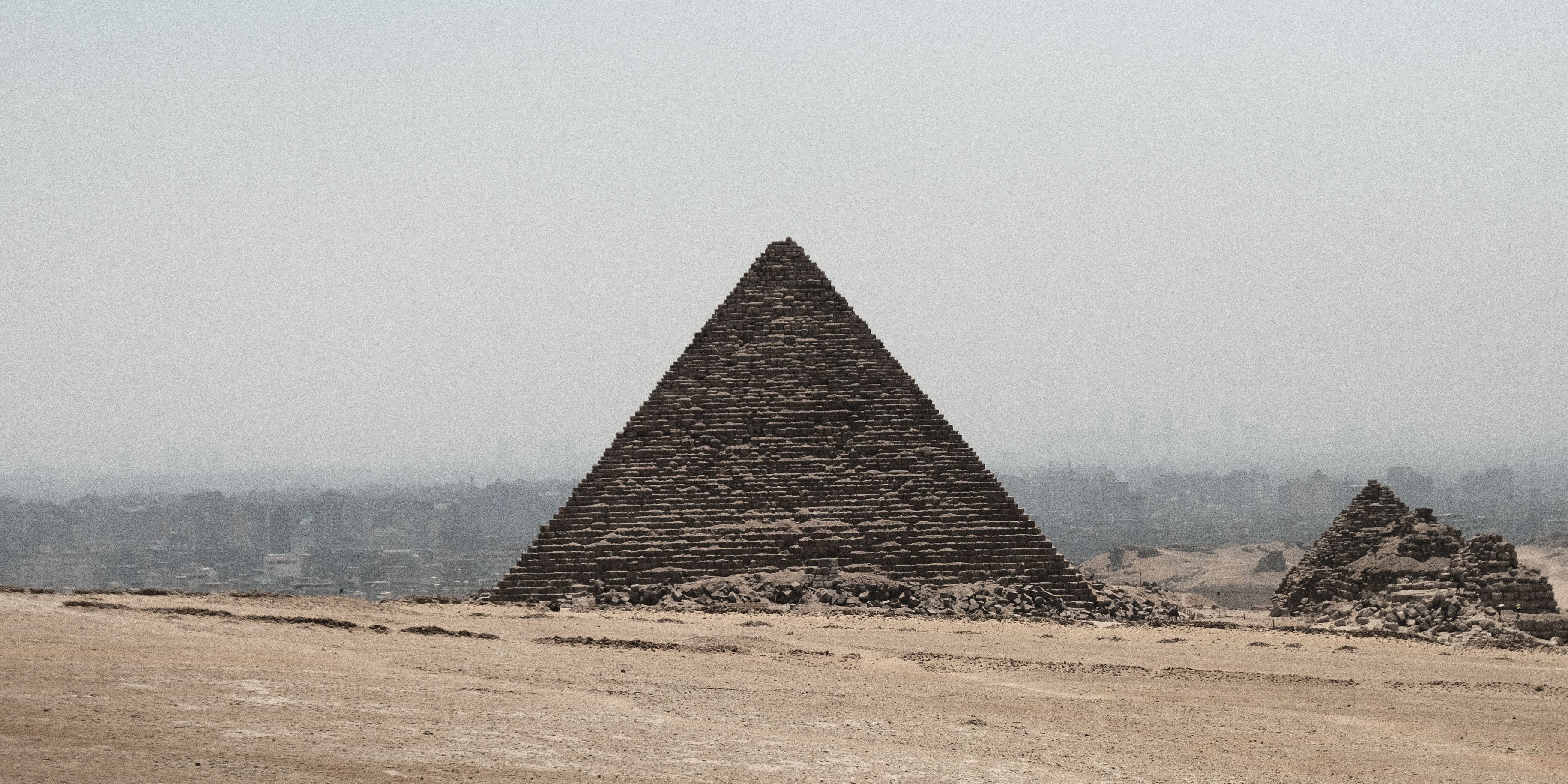 Giza Pyramid Overlooking Cairo Skyline · Free Stock Photo