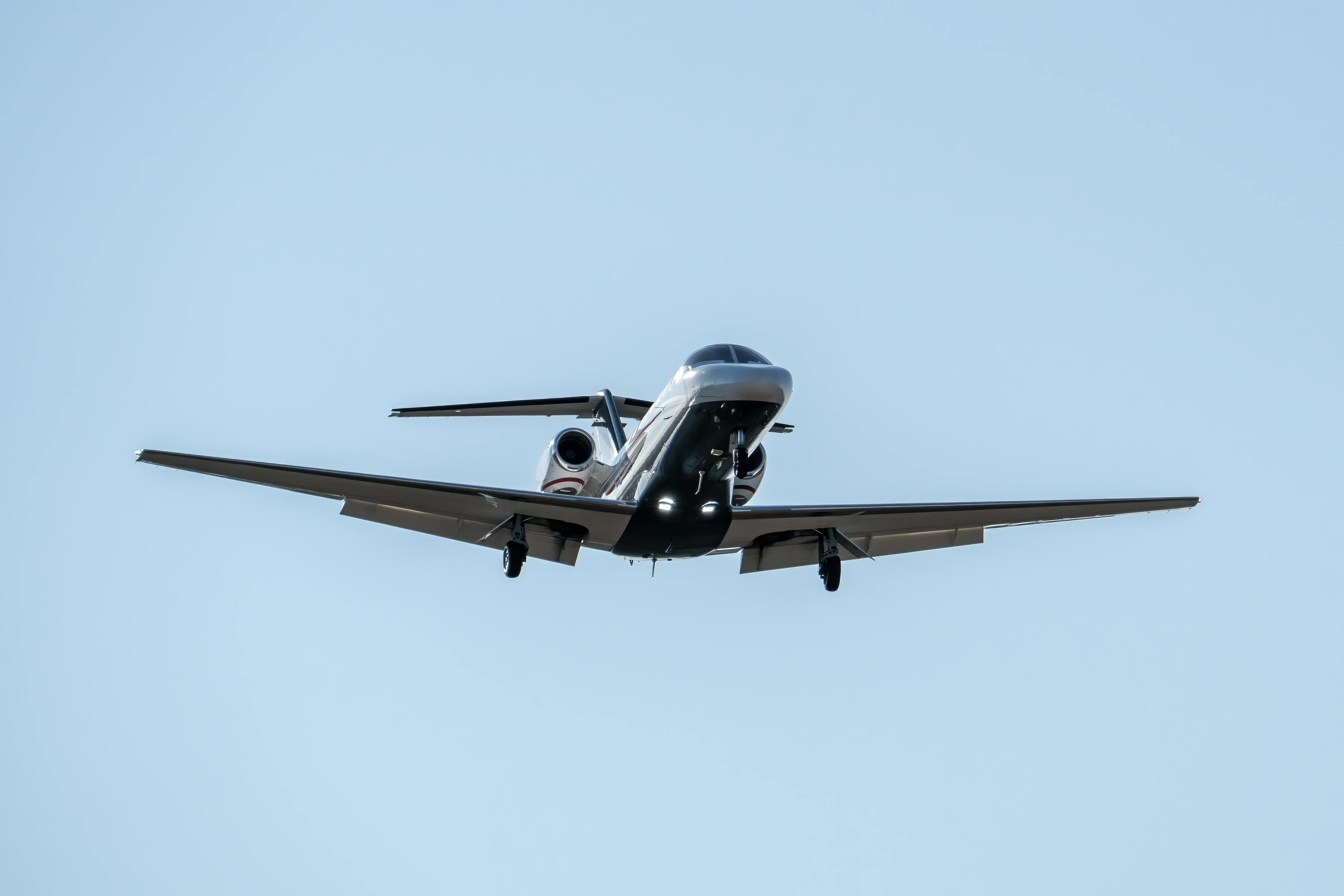 Private Jet in Flight Over Manises, Spain · Free Stock Photo