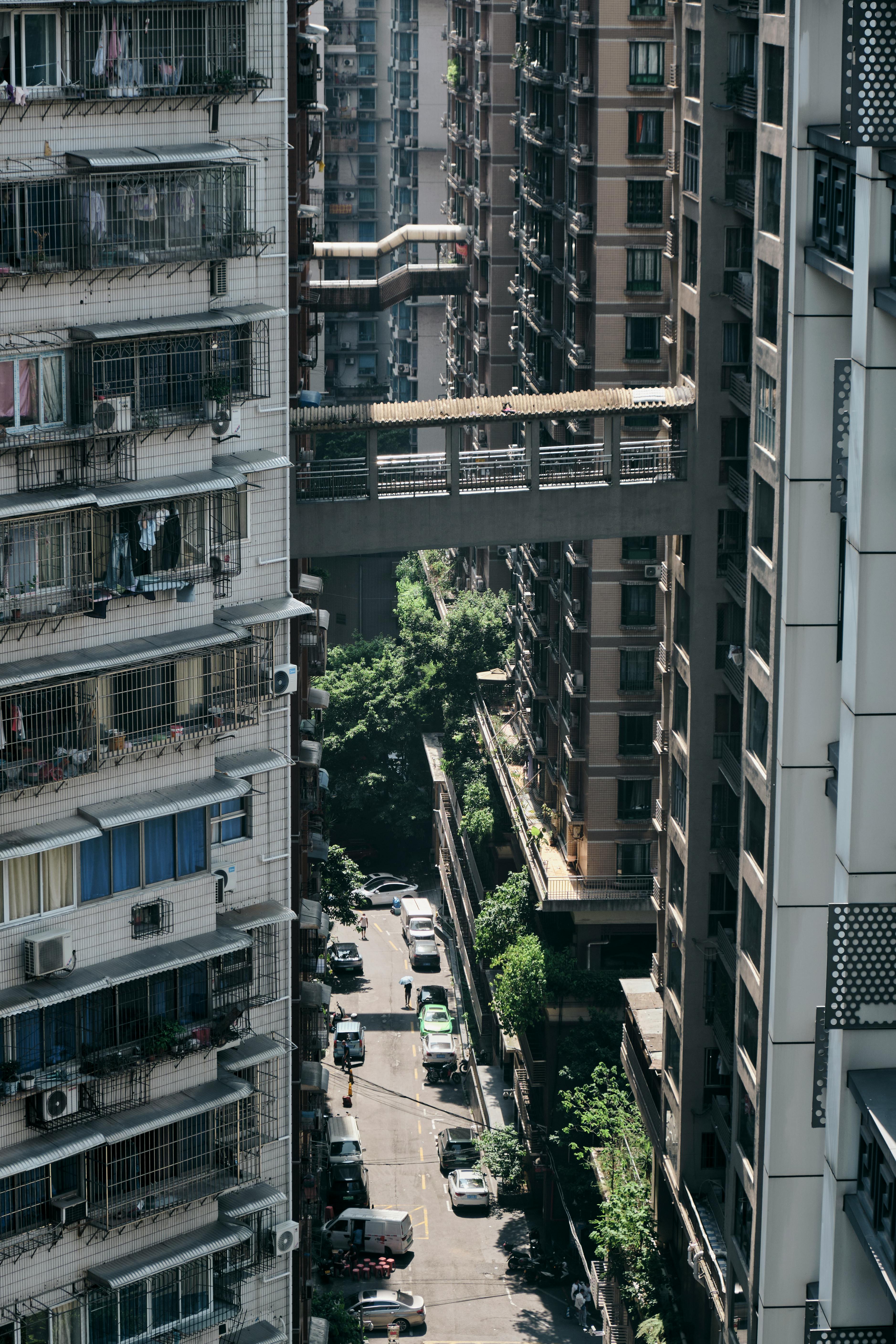 High-rise buildings and connecting bridge in urban setting · Free Stock ...