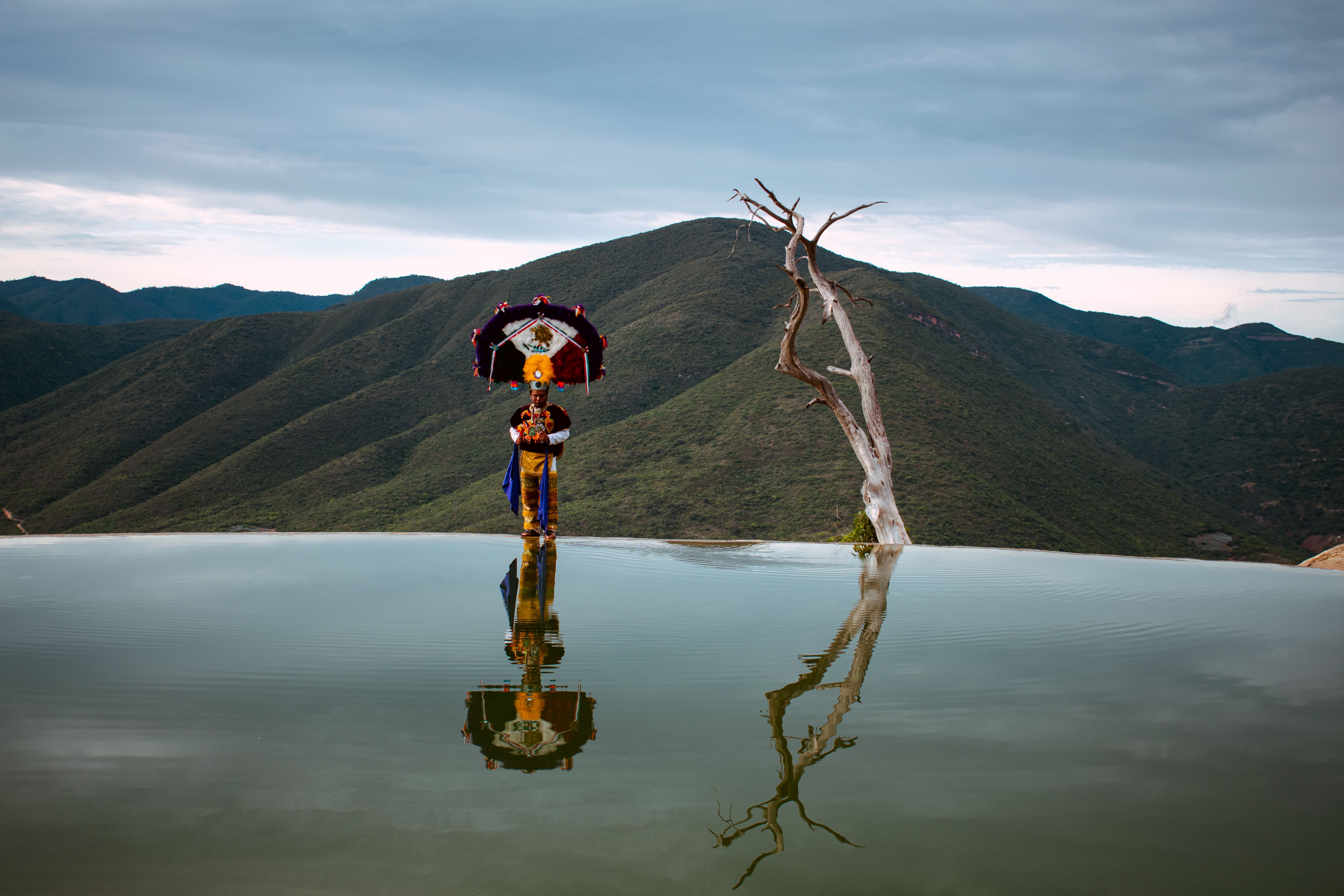 Traditional Dancer in Oaxaca's Scenic Landscape · Free Stock Photo
