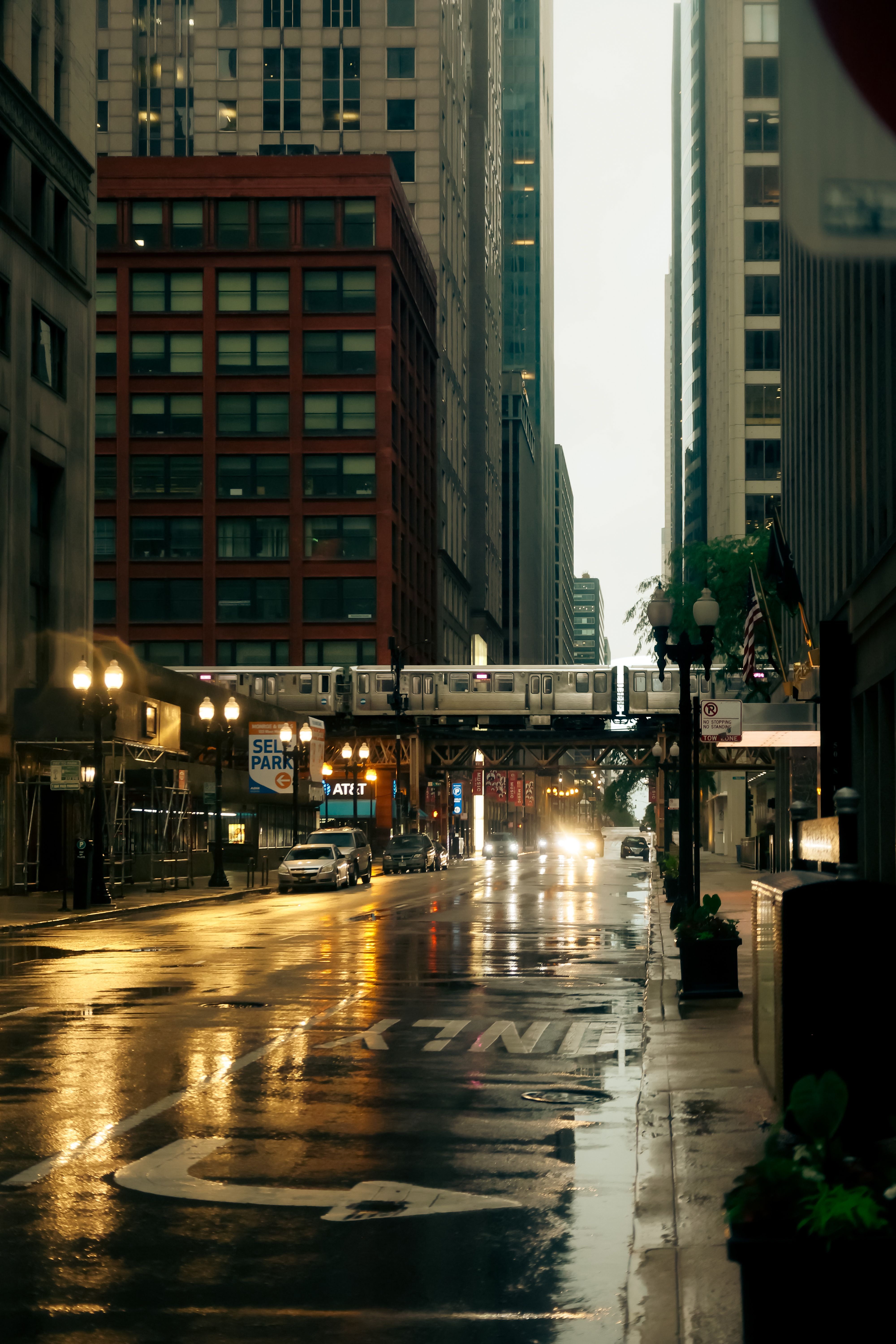 Rainy City Street with Reflective Pavement · Free Stock Photo