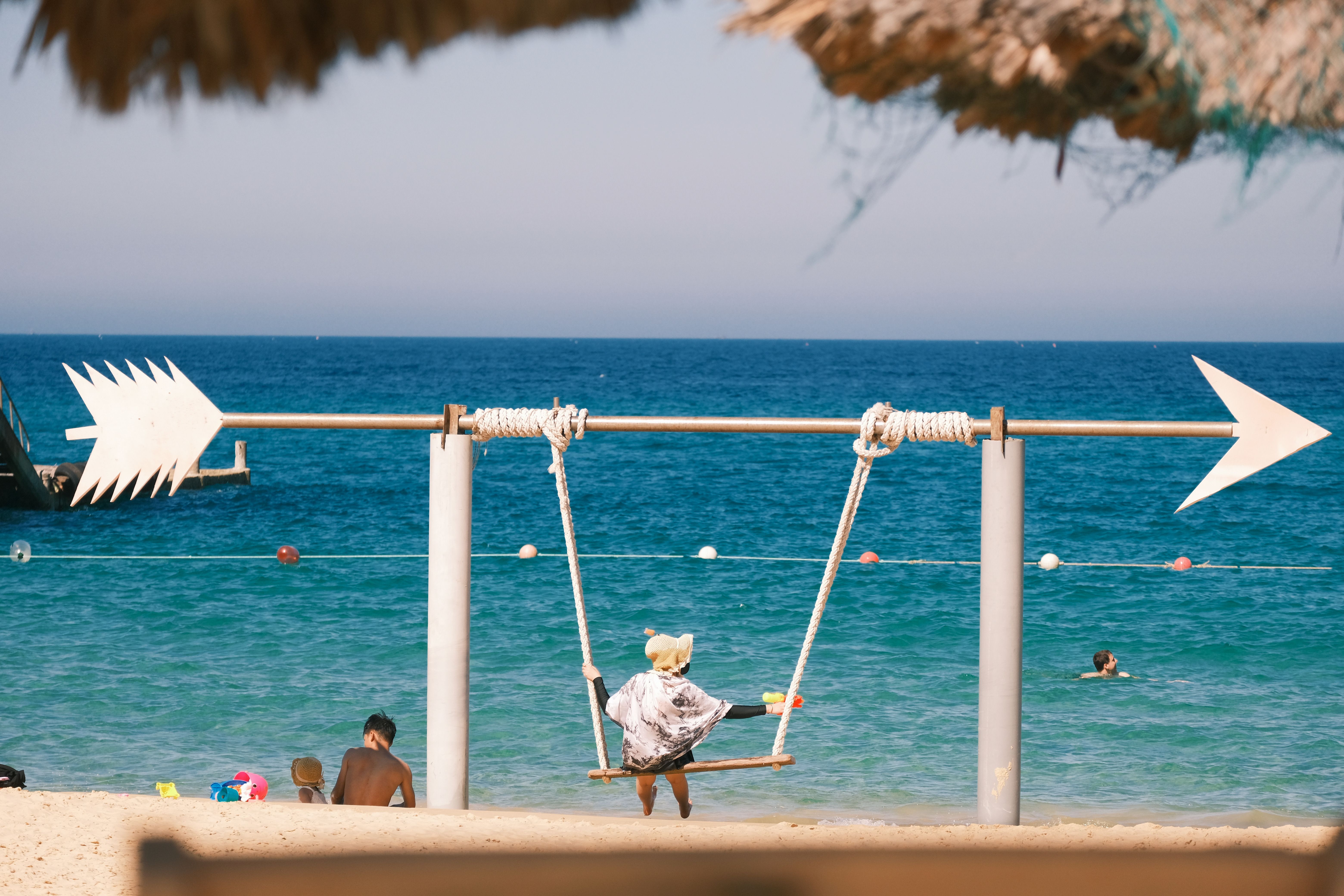 Tropical Beach Swing Overlooking Ocean · Free Stock Photo