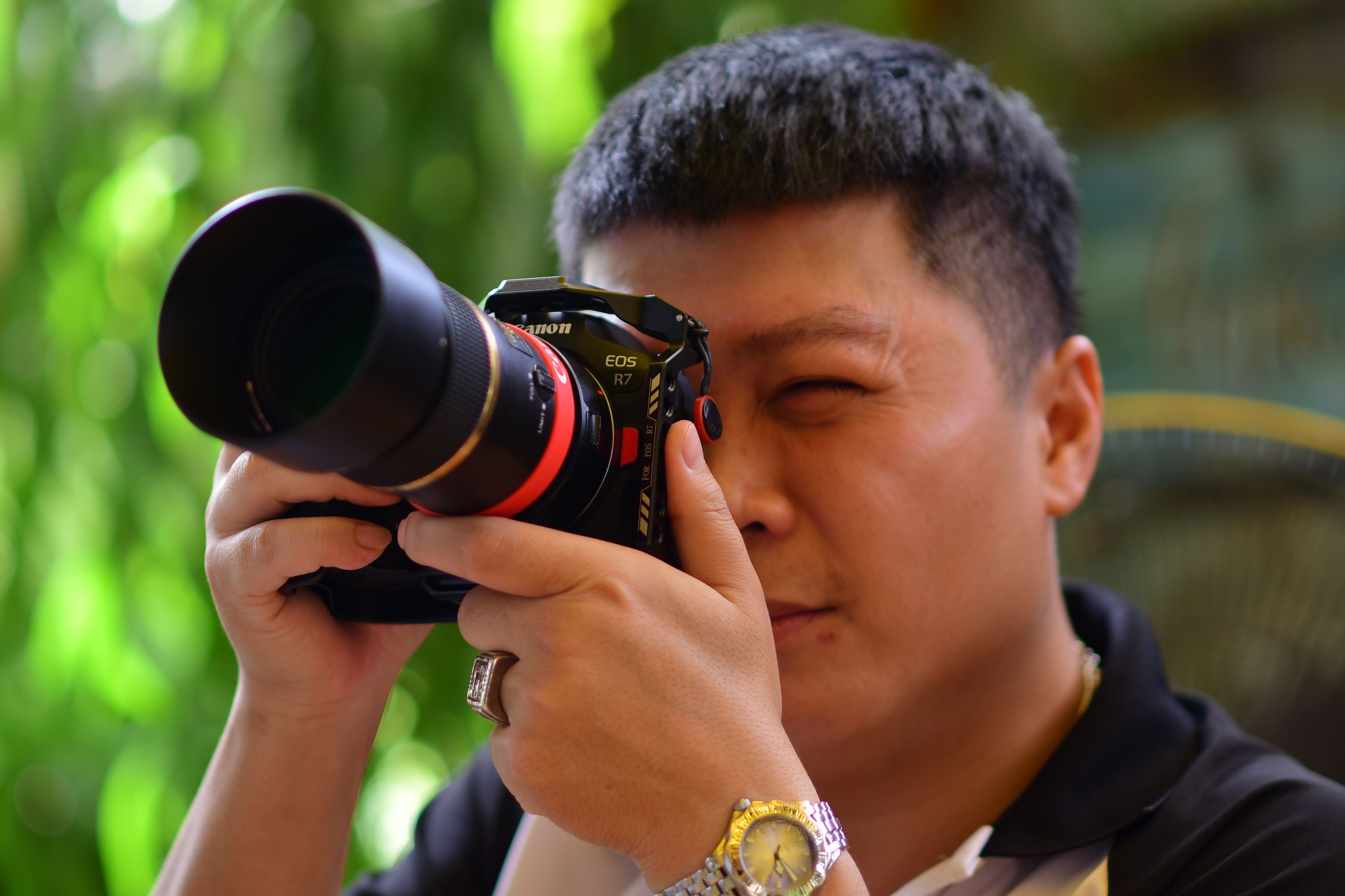 Man Taking Photograph with Professional Camera · Free Stock Photo