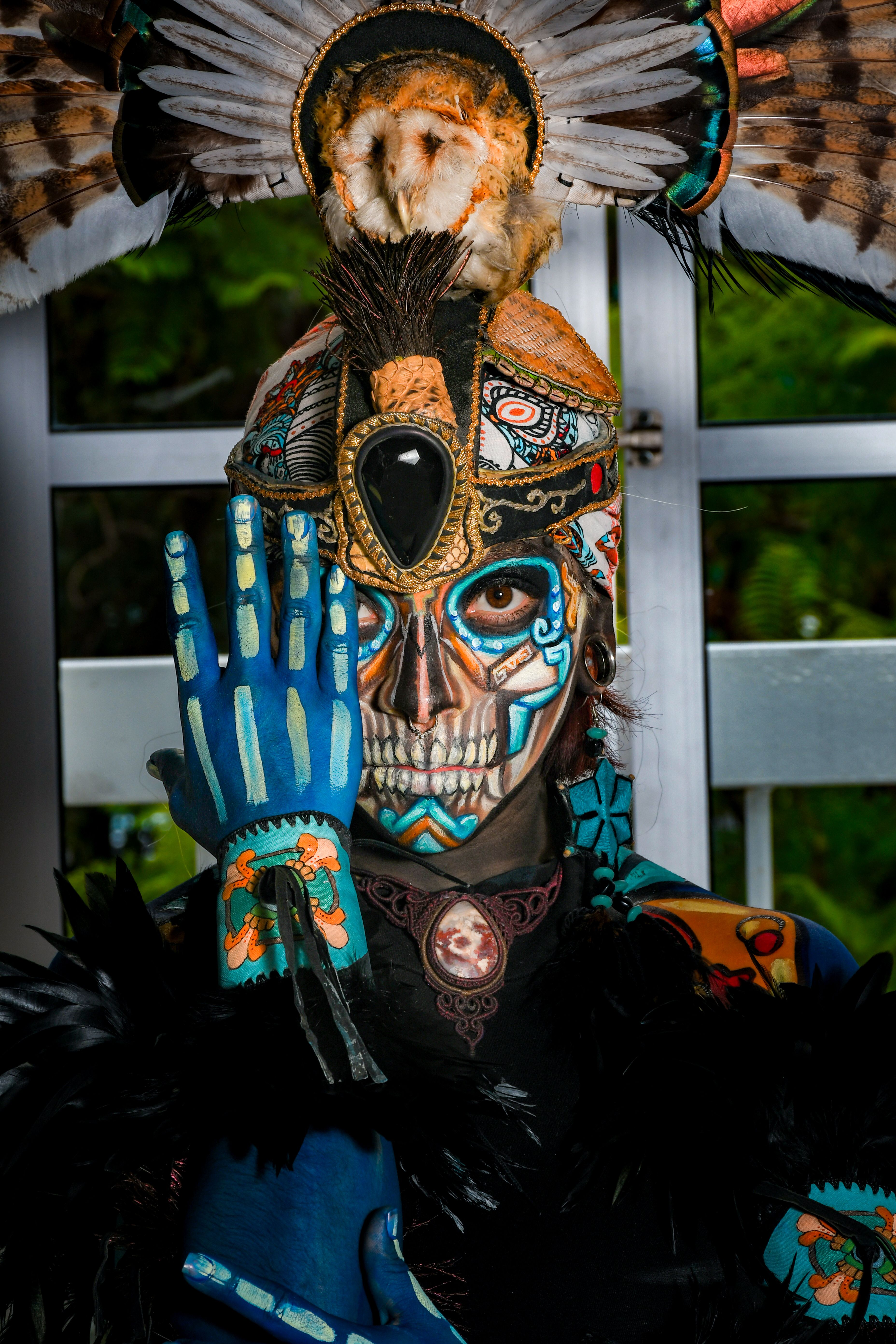 Intricate Tribal Costume with Dramatic Face Paint · Free Stock Photo
