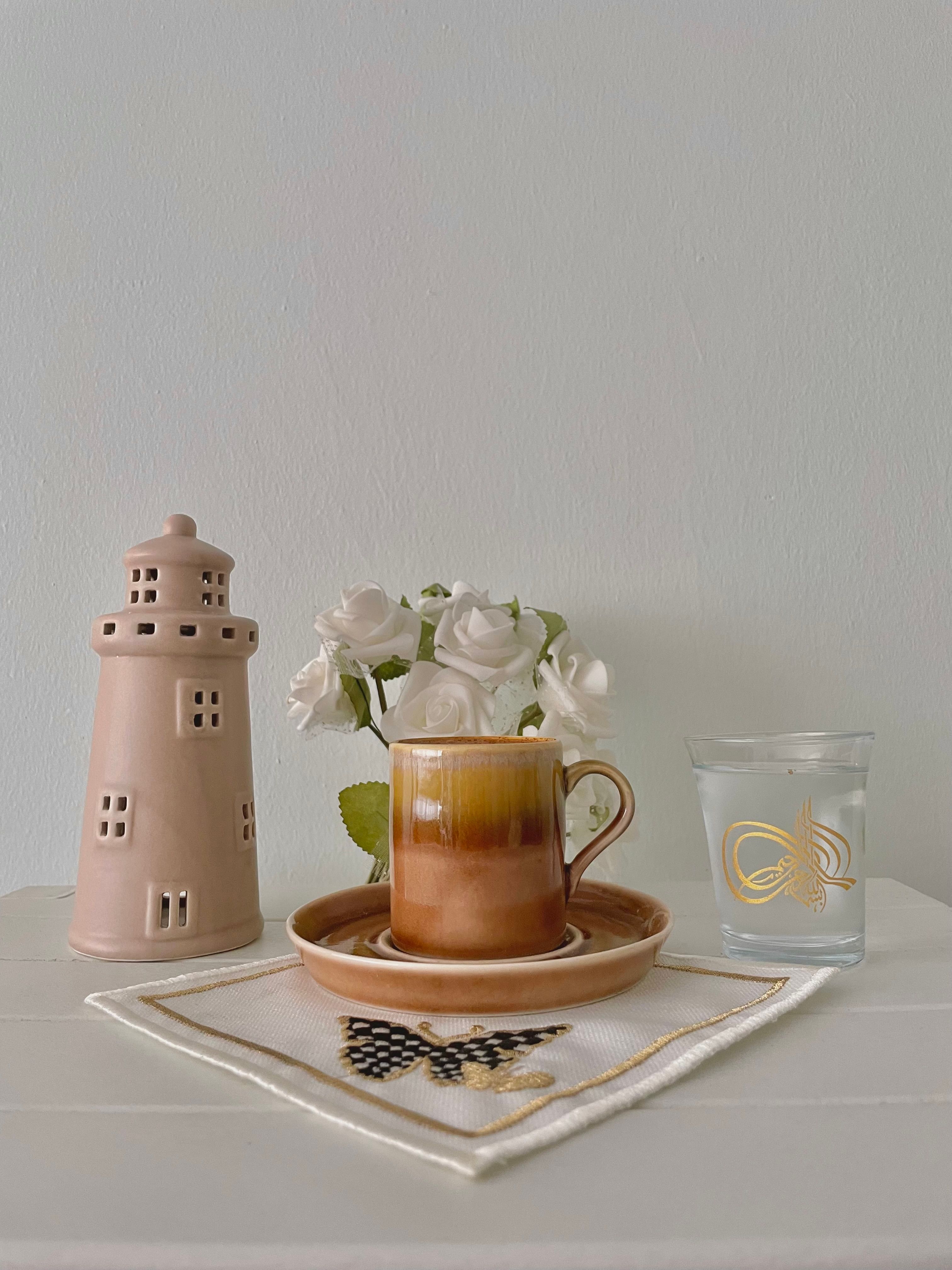 Minimalist Tea Set with Decorative Lighthouse · Free Stock Photo