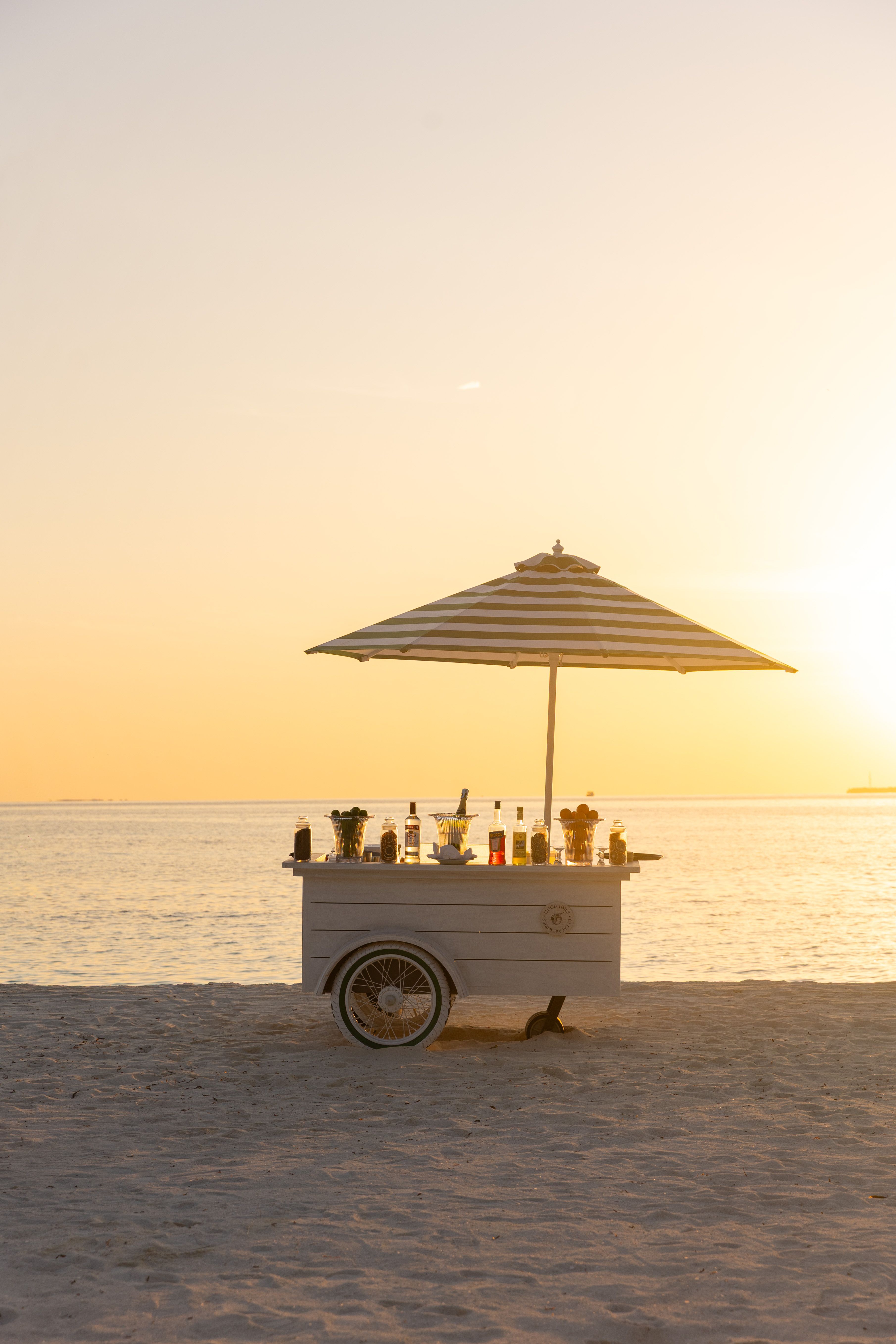 Tropical Beach Cocktail Stand at Sunset · Free Stock Photo