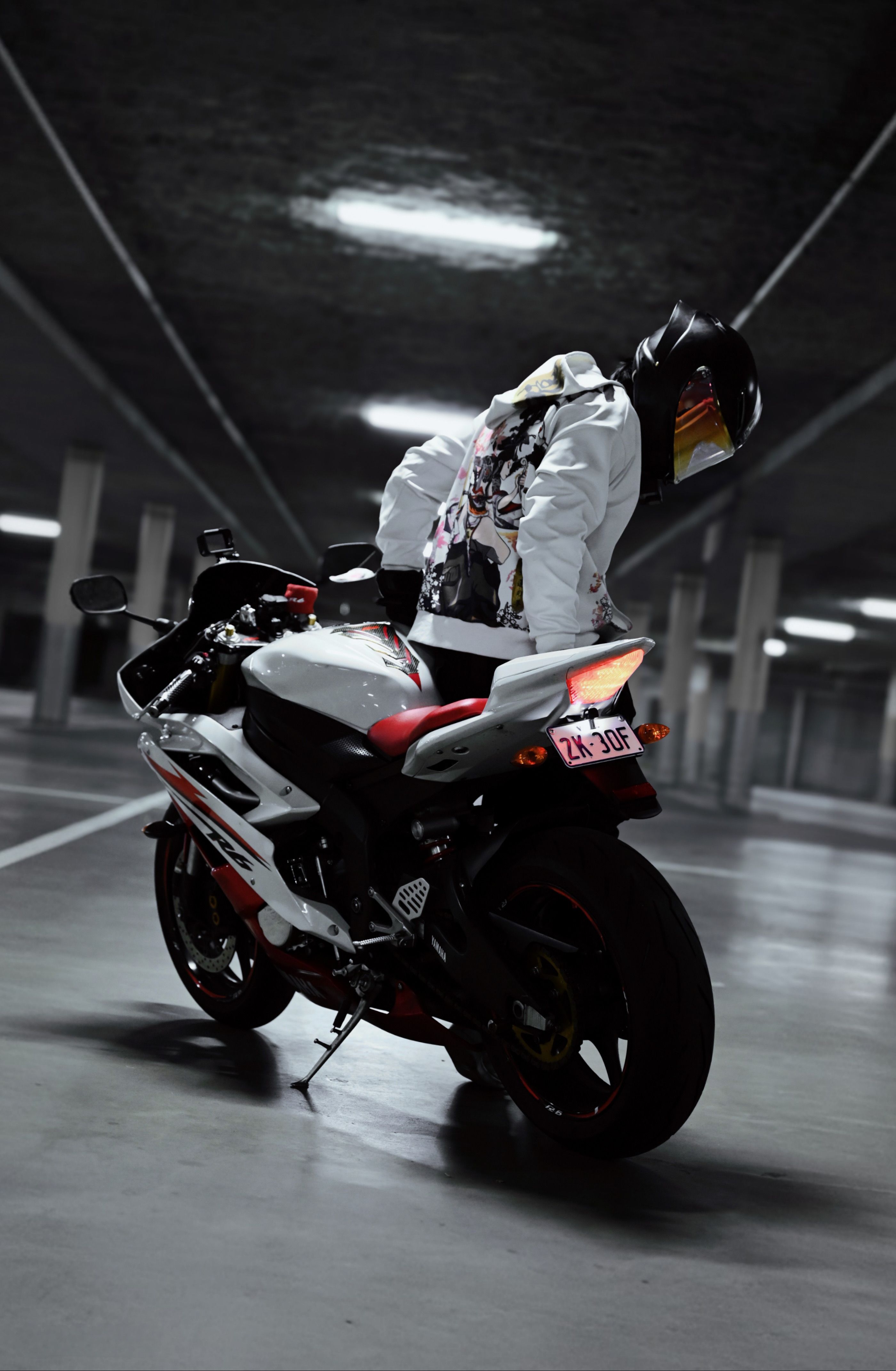 Dynamic Shot of Biker in Urban Parking Garage · Free Stock Photo