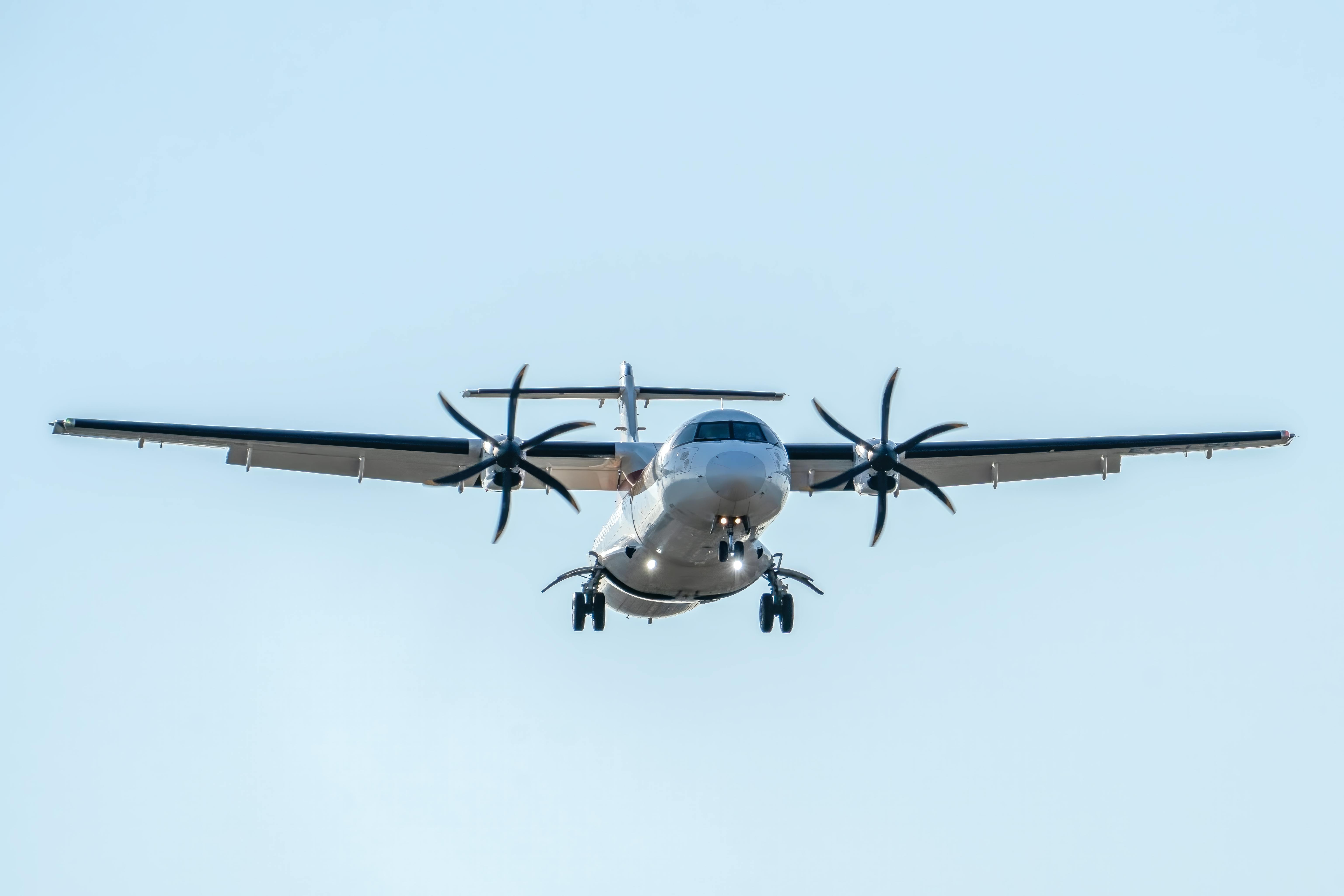 ATR 72 Aircraft in Flight Over Manises · Free Stock Photo