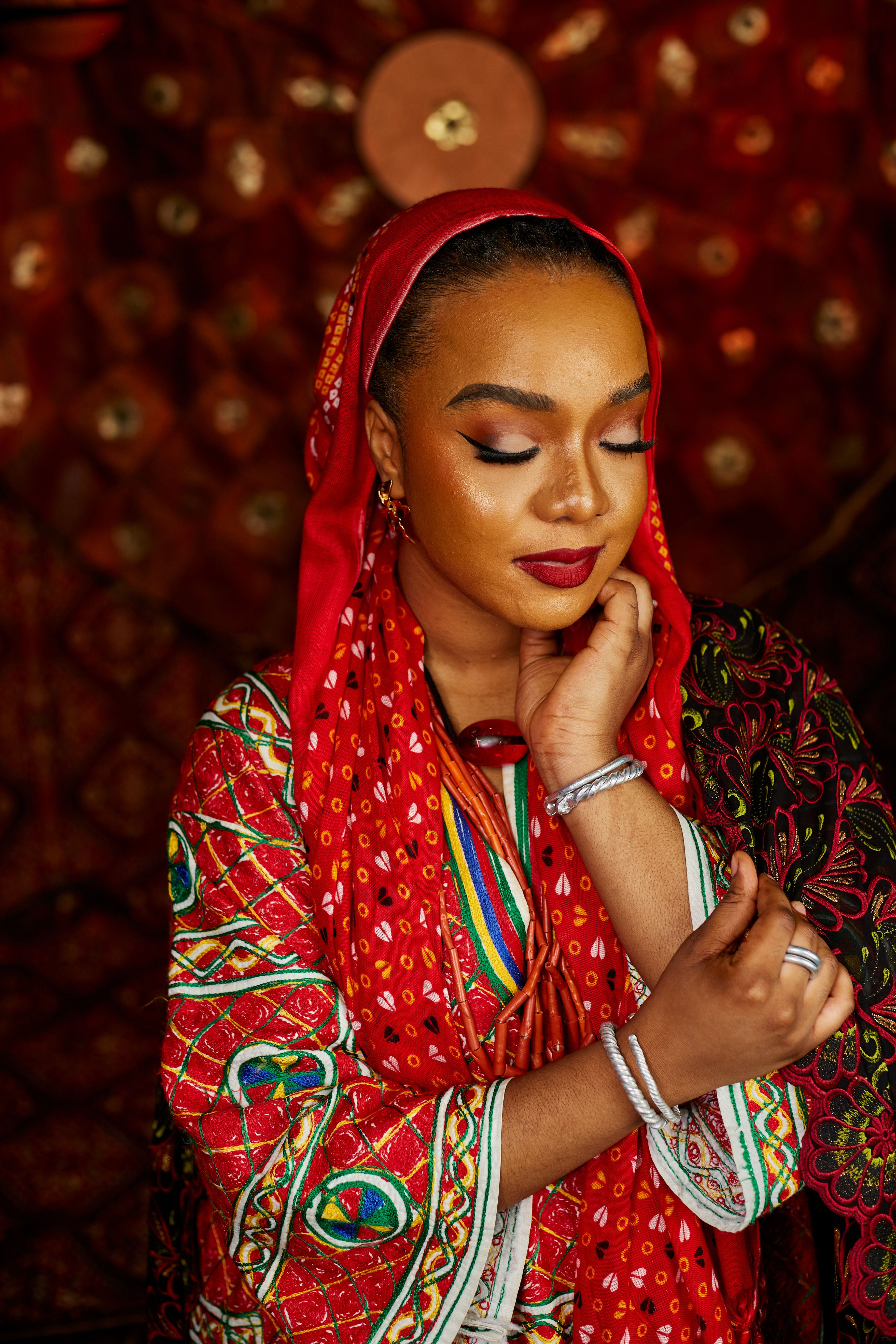Elegant Woman in Traditional Colorful Attire · Free Stock Photo