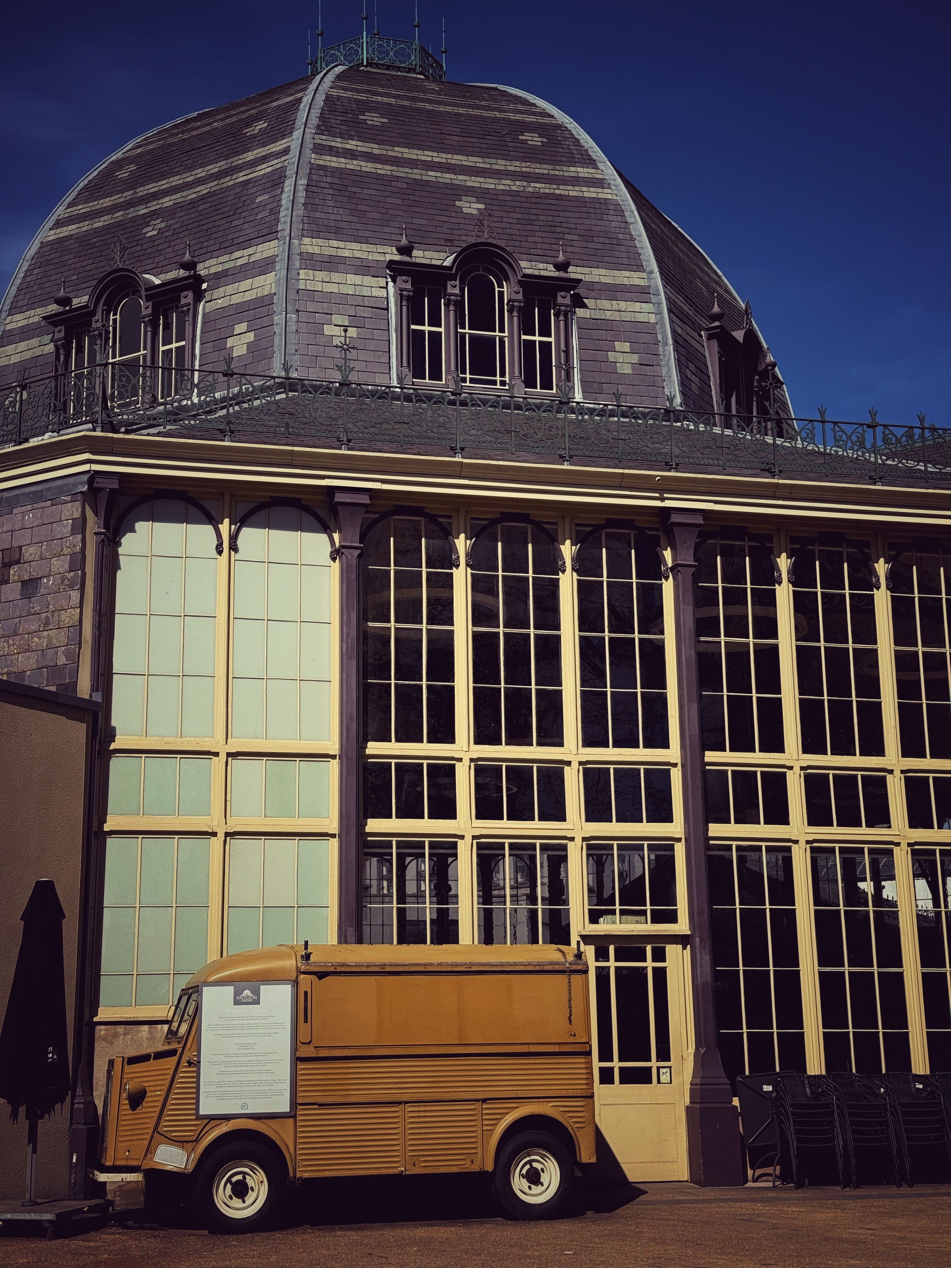 Vintage Van Parked by Historical Dome Building · Free Stock Photo