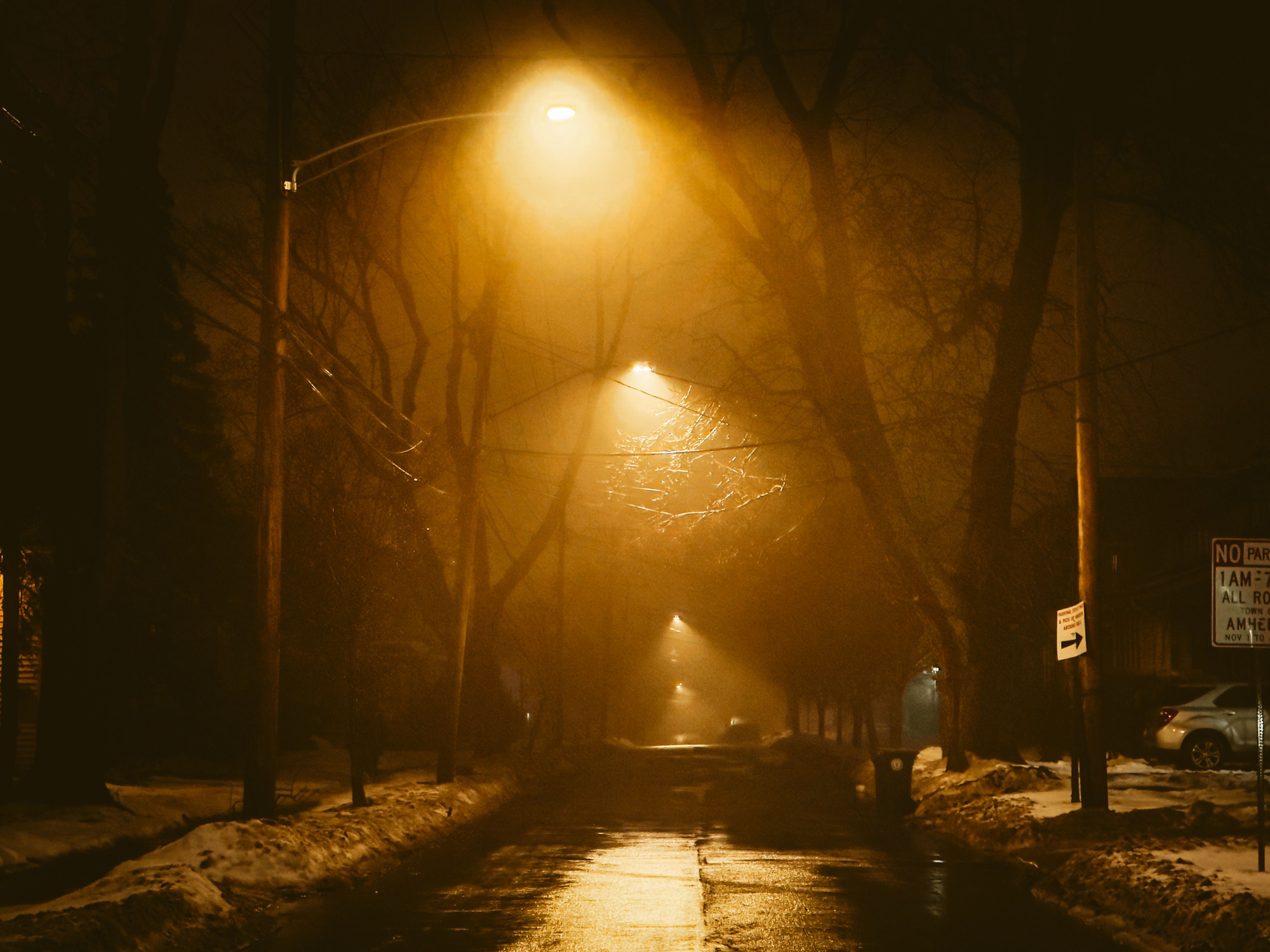 Moody Street Scene Illuminated by Streetlights at Night · Free Stock Photo