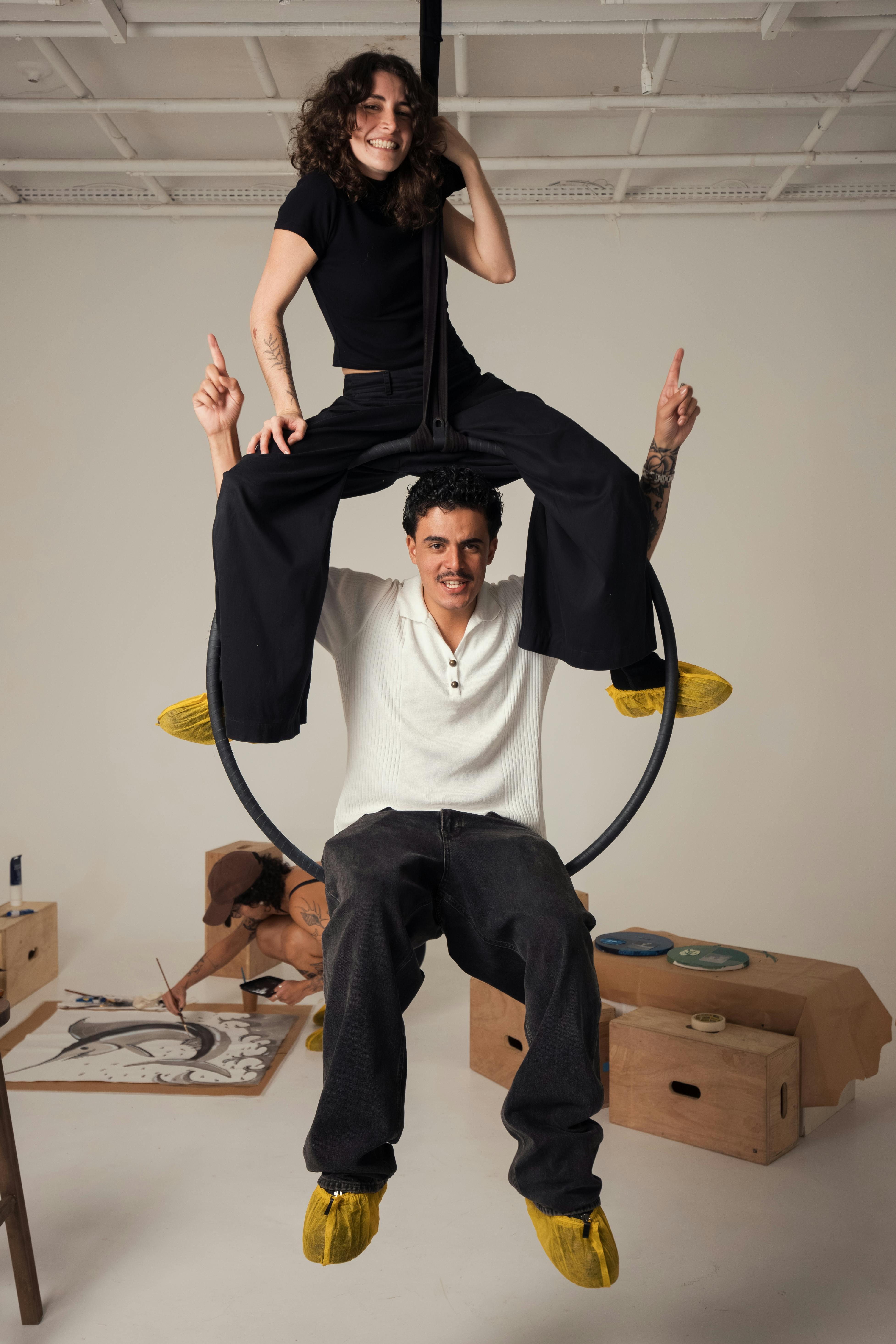 Dynamic Duo in Aerial Hoop Performance · Free Stock Photo