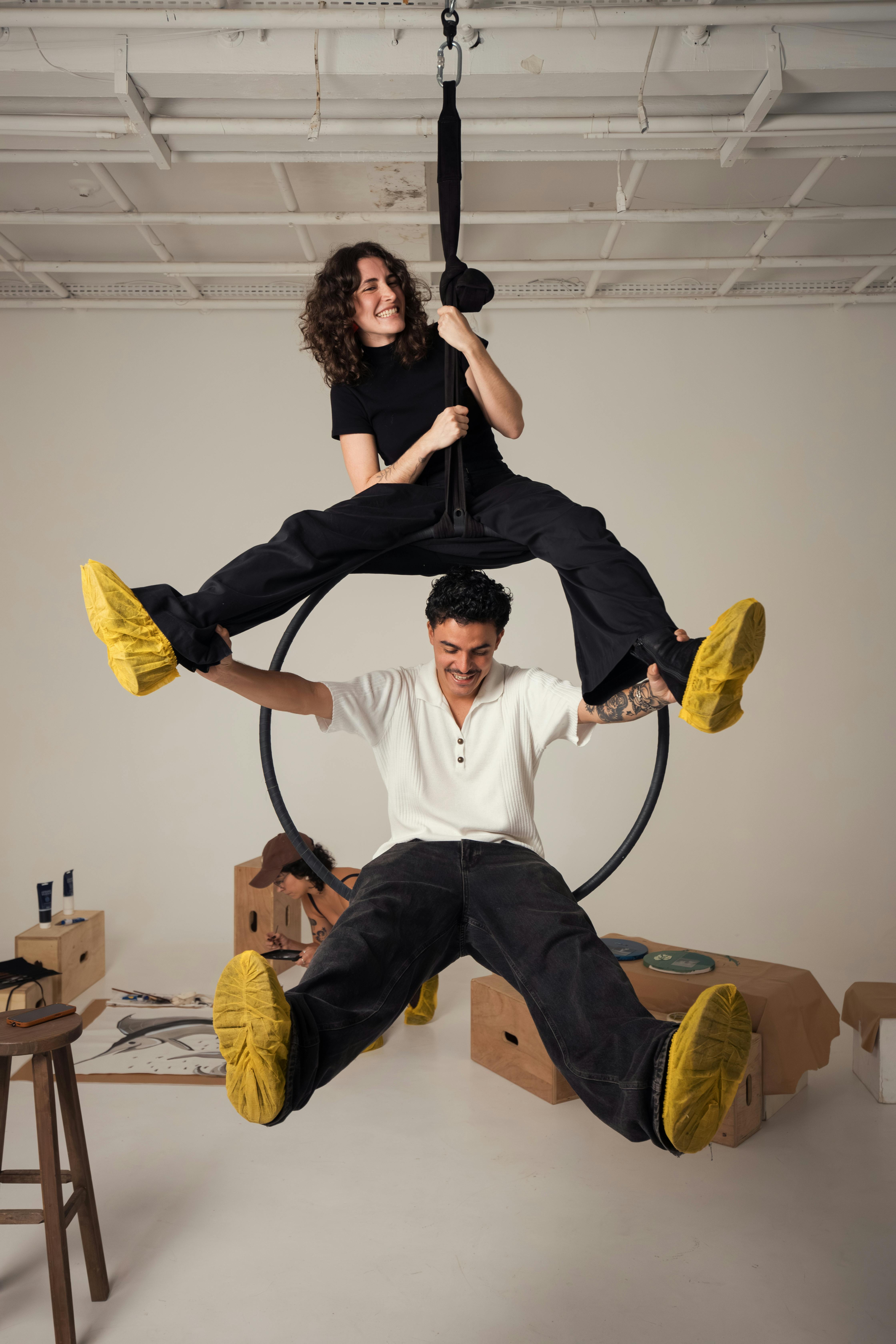 Dynamic Duo in Aerial Hoop Performance · Free Stock Photo